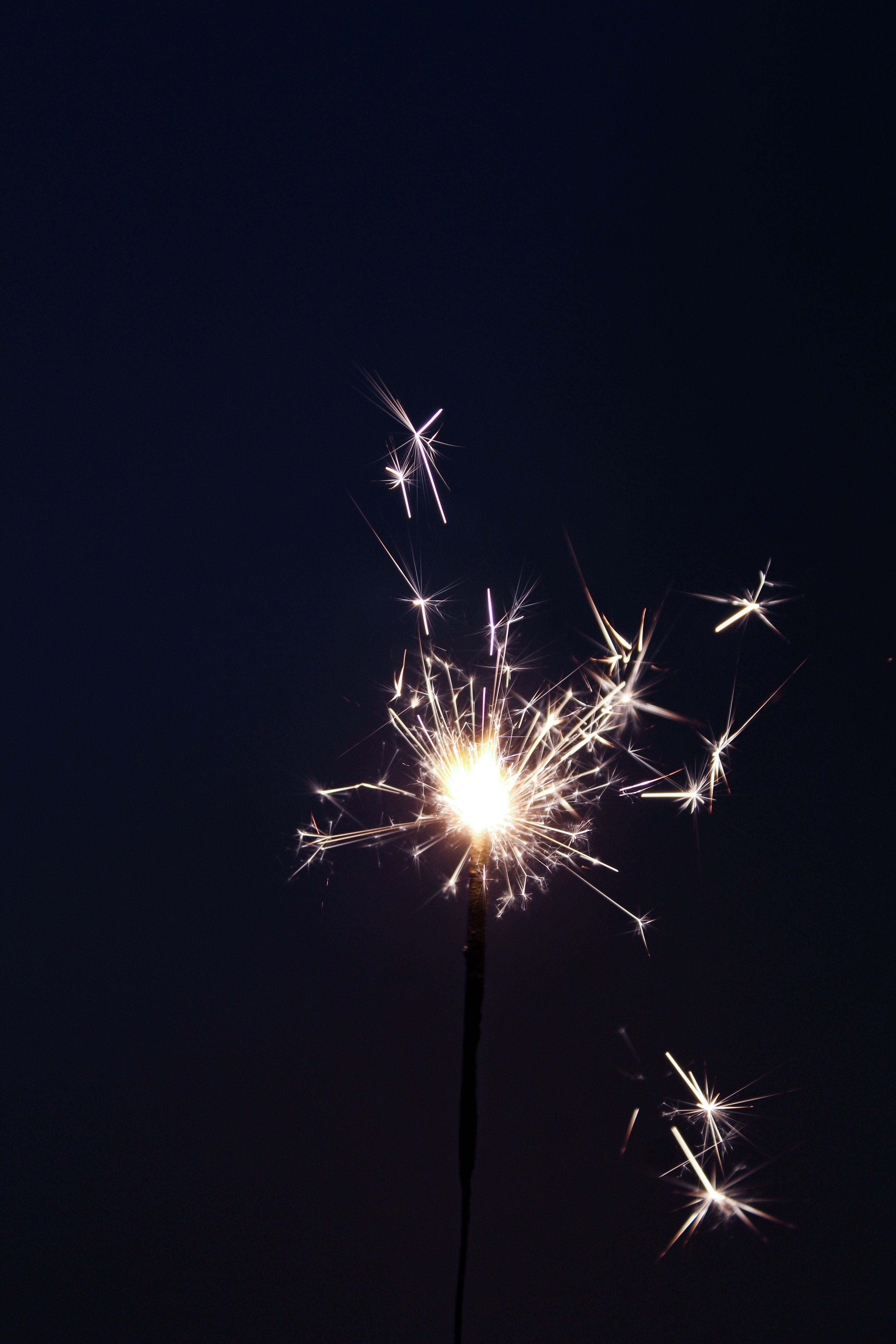 Sparklers on Night Sky · Free Stock Photo
