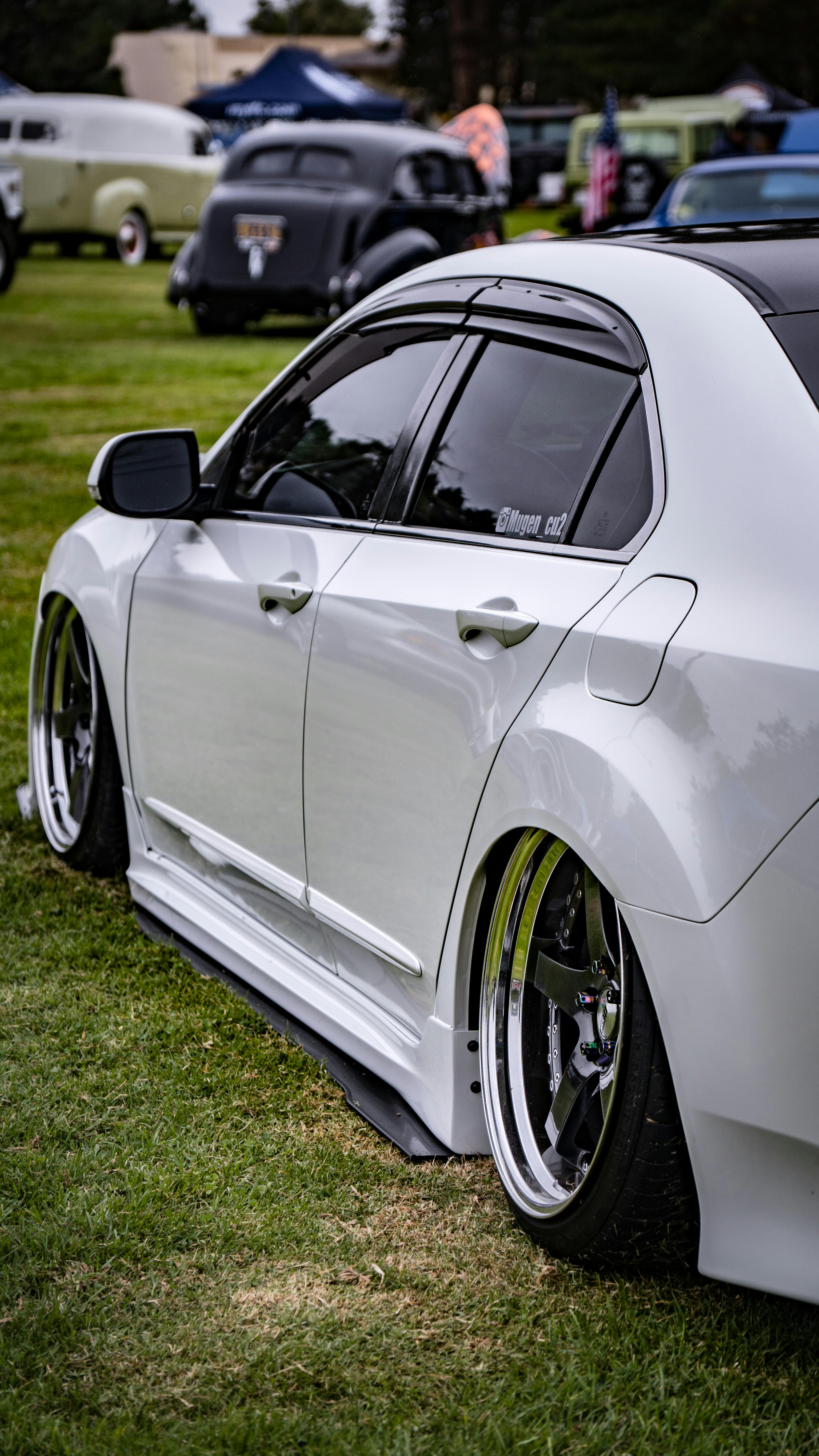 A White Car on Green Grass · Free Stock Photo