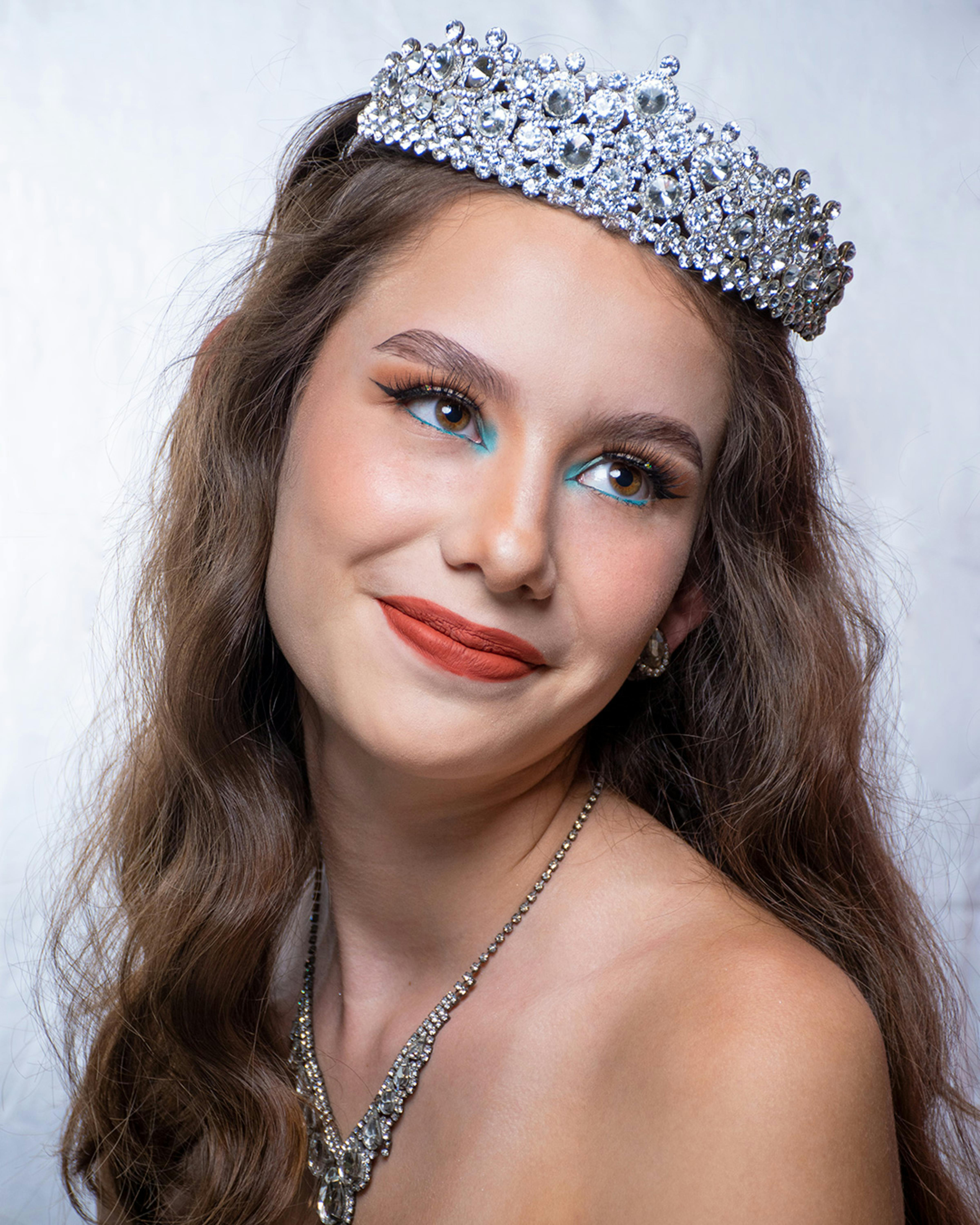 Portrait of a Woman with a Tiara · Free Stock Photo