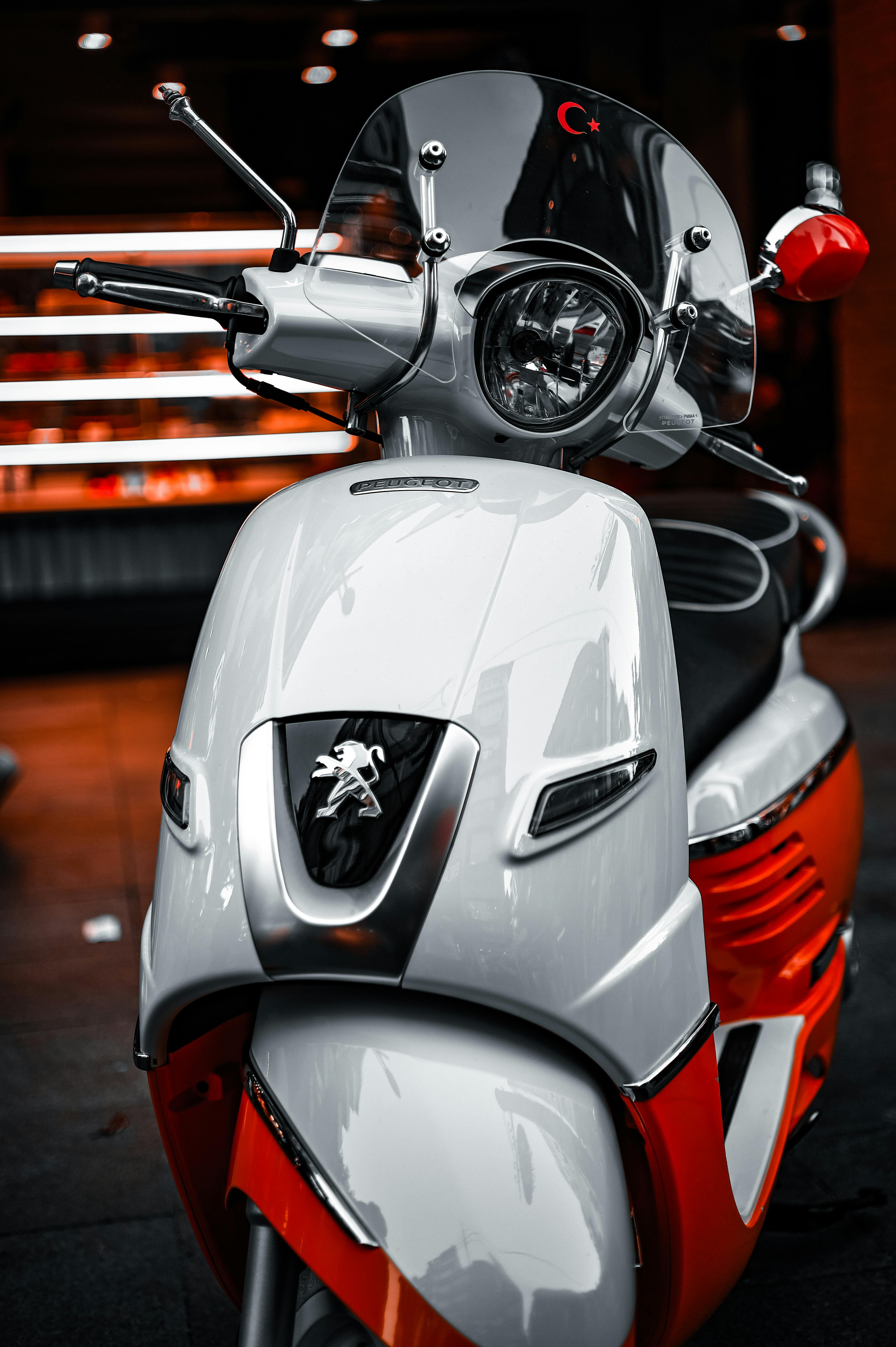 White Shiny Scooter in Close Up Photography · Free Stock Photo