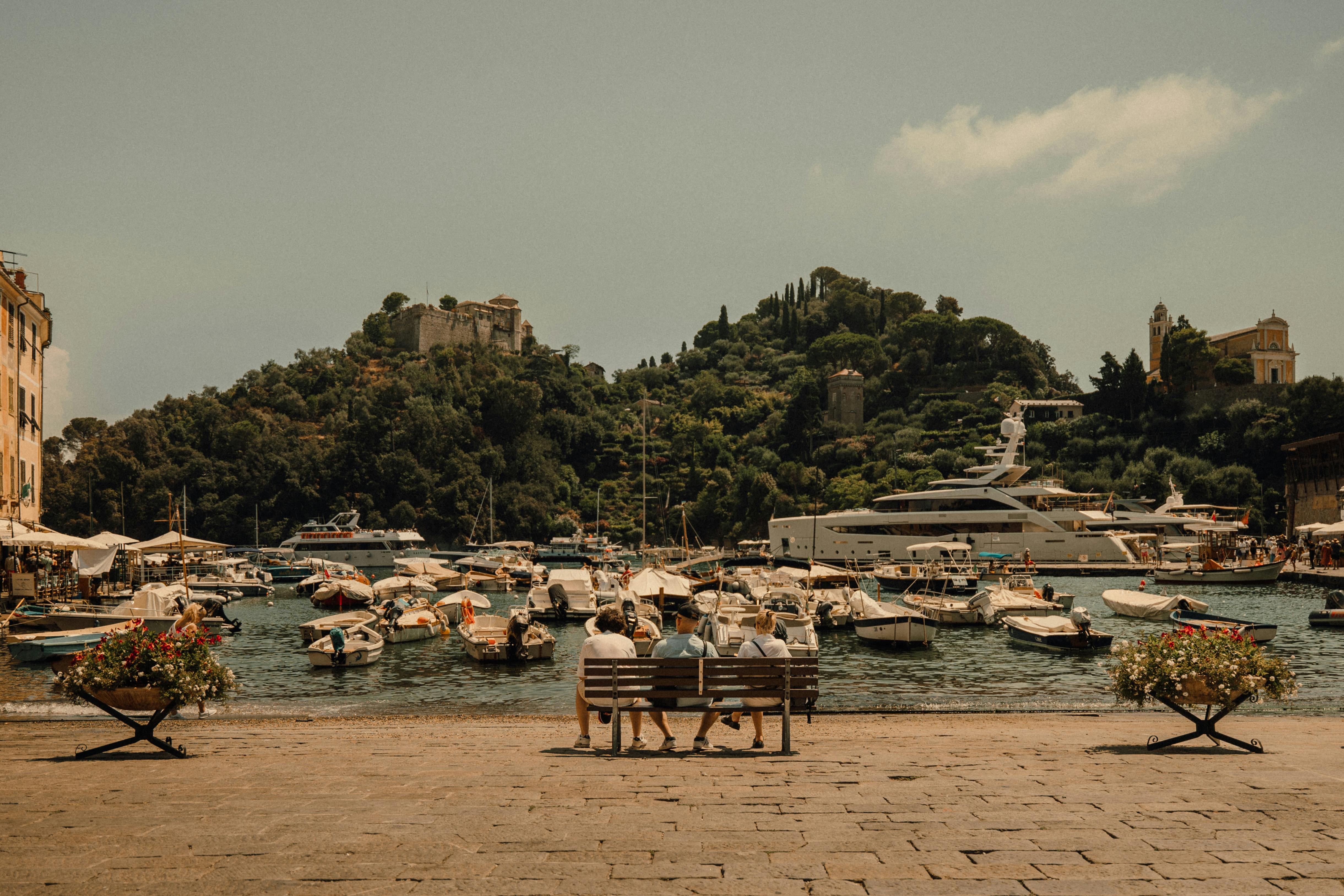 People Standing on Gray Concrete Docking Area · Free Stock Photo