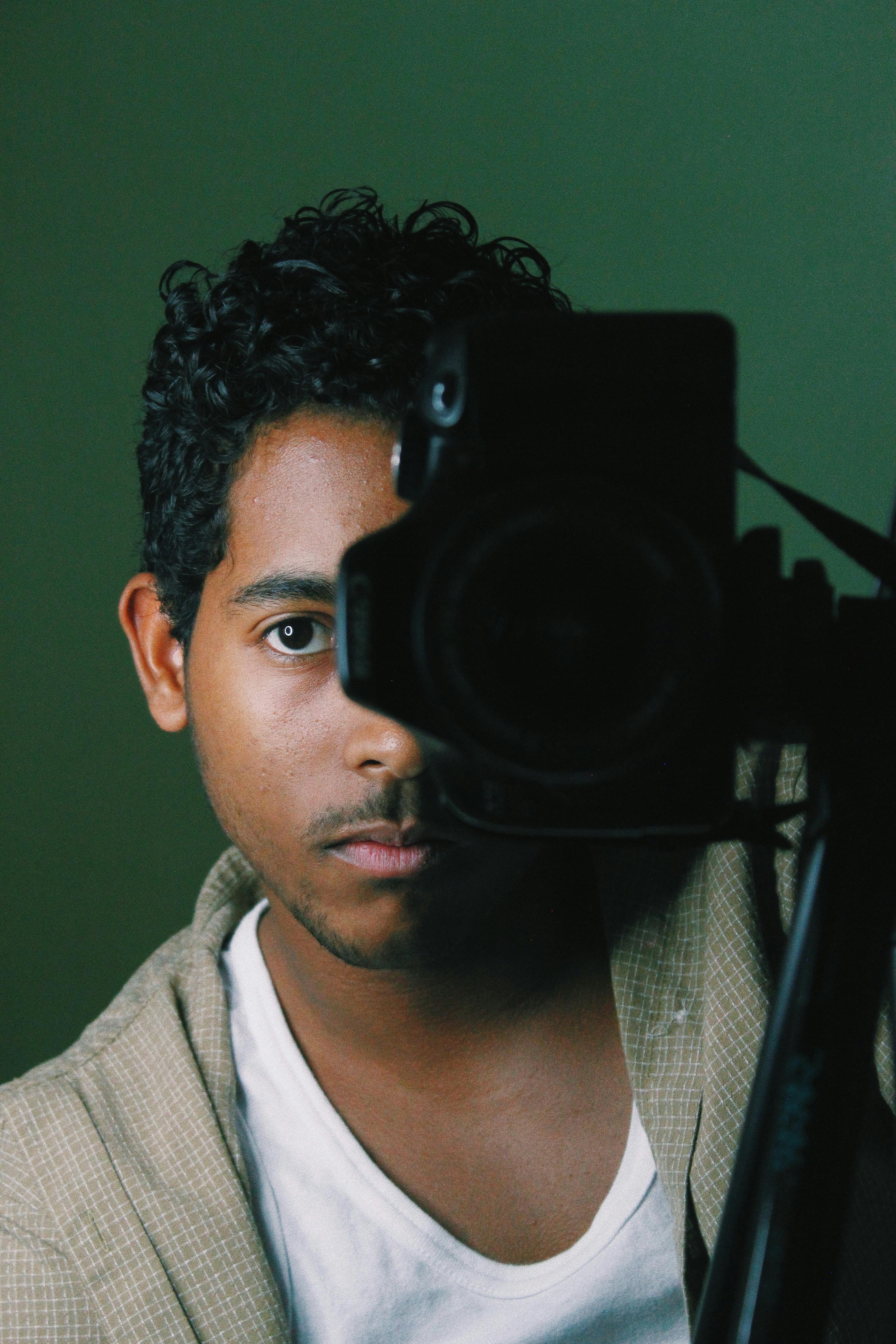 Man with Professional Camera Photographing Bird in Mountains · Free ...