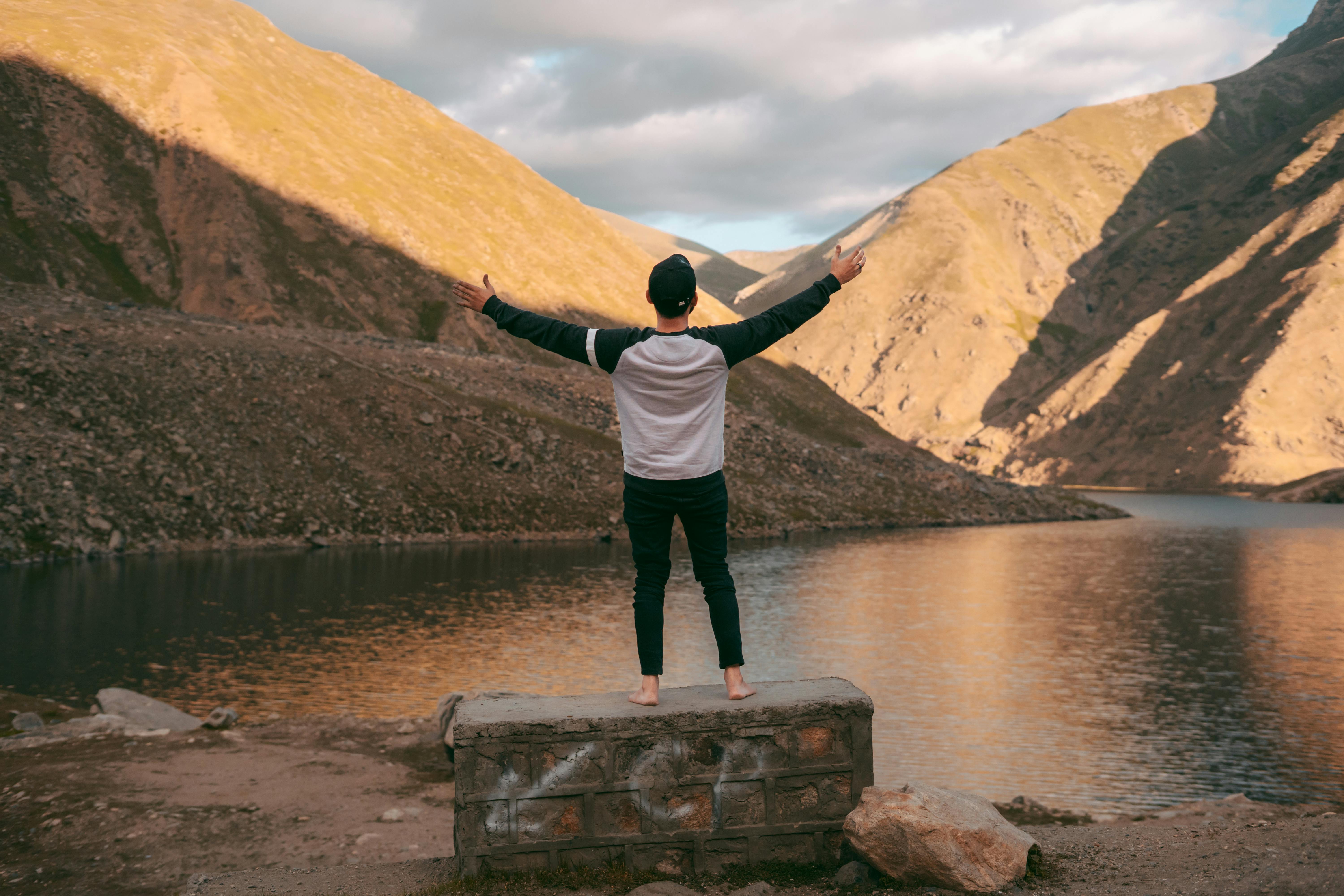 Man Standing on a Rock · Free Stock Photo