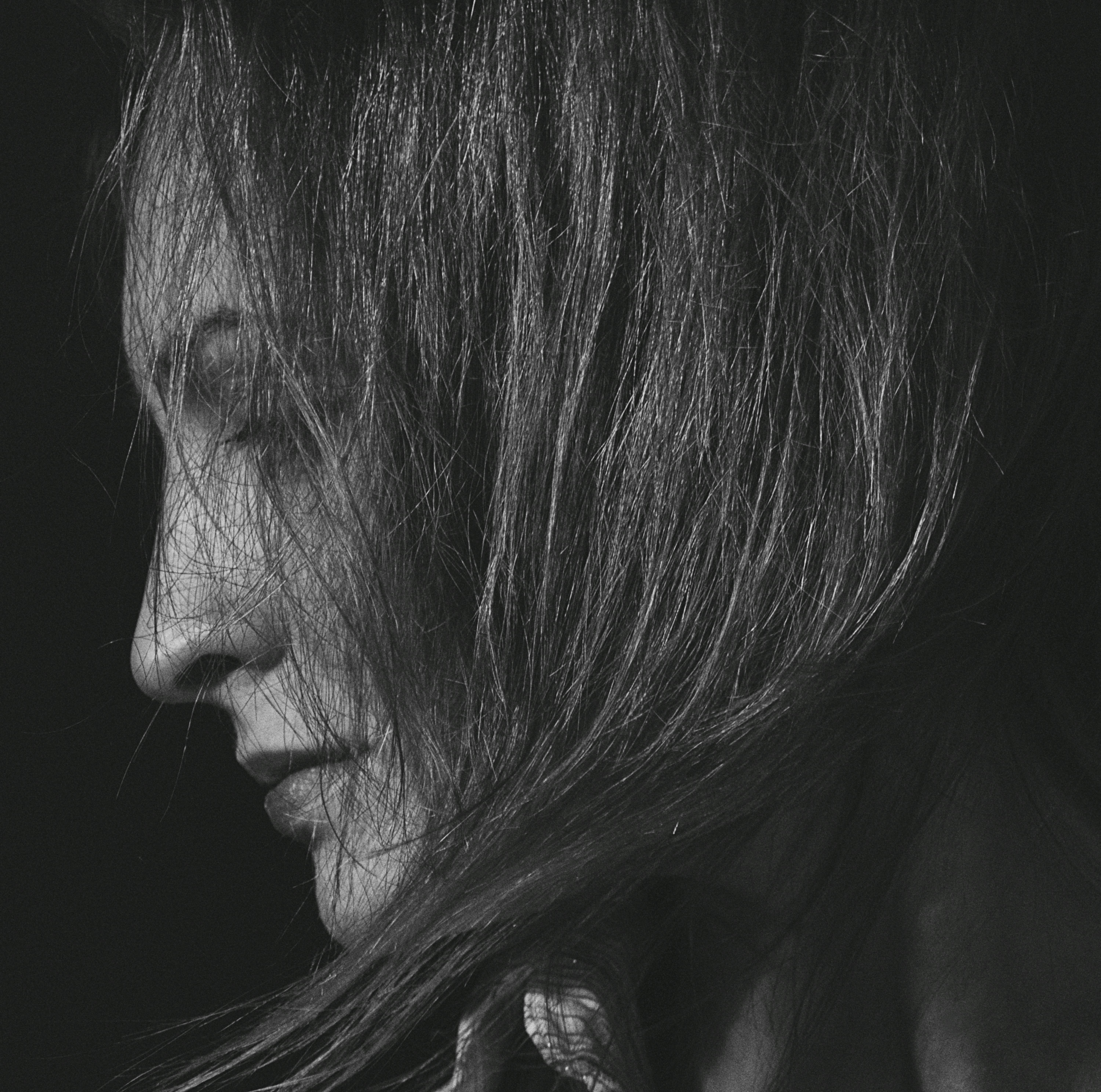 Grayscale Photo of a Woman · Free Stock Photo