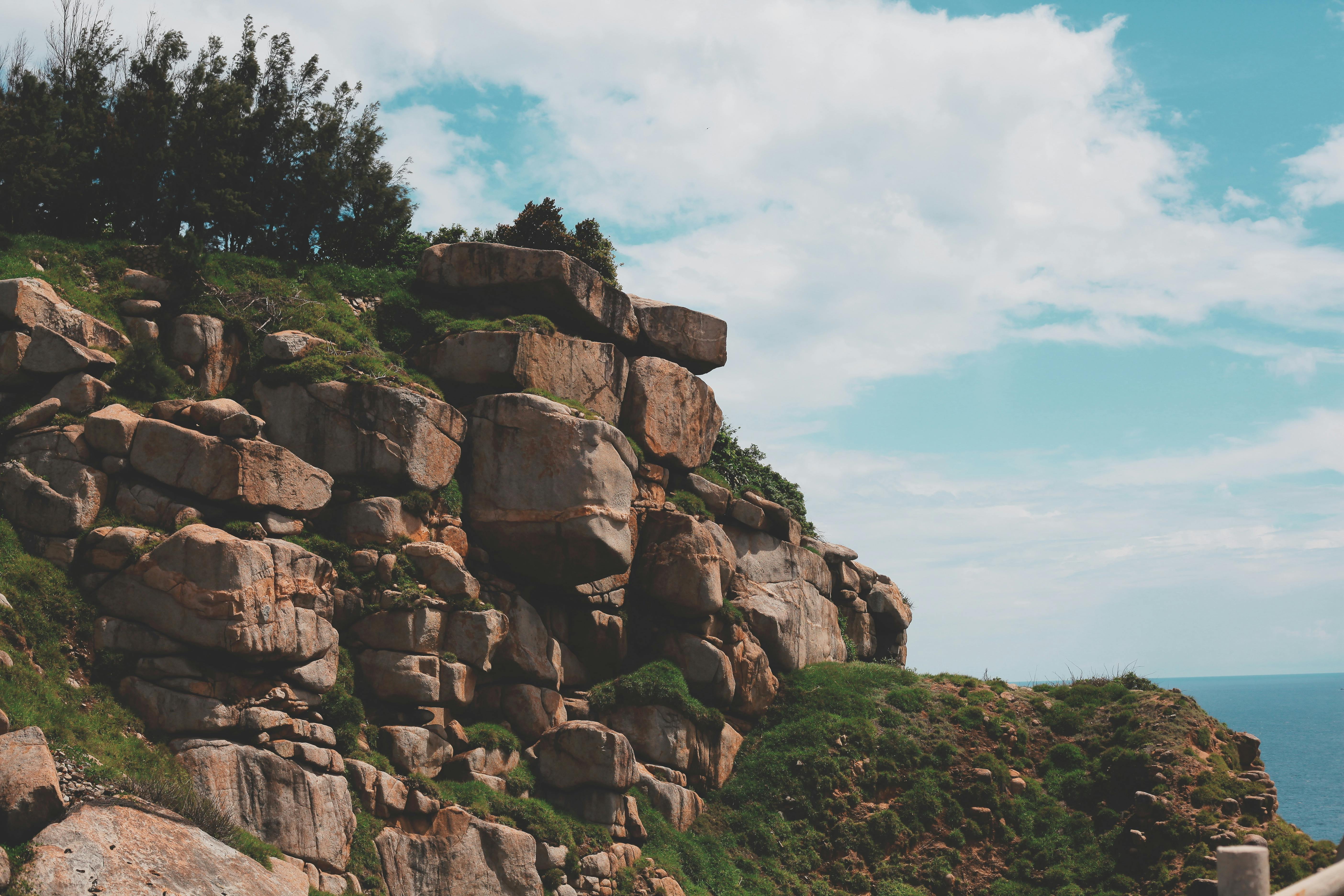 Rock Formation at the Cliff Side · Free Stock Photo