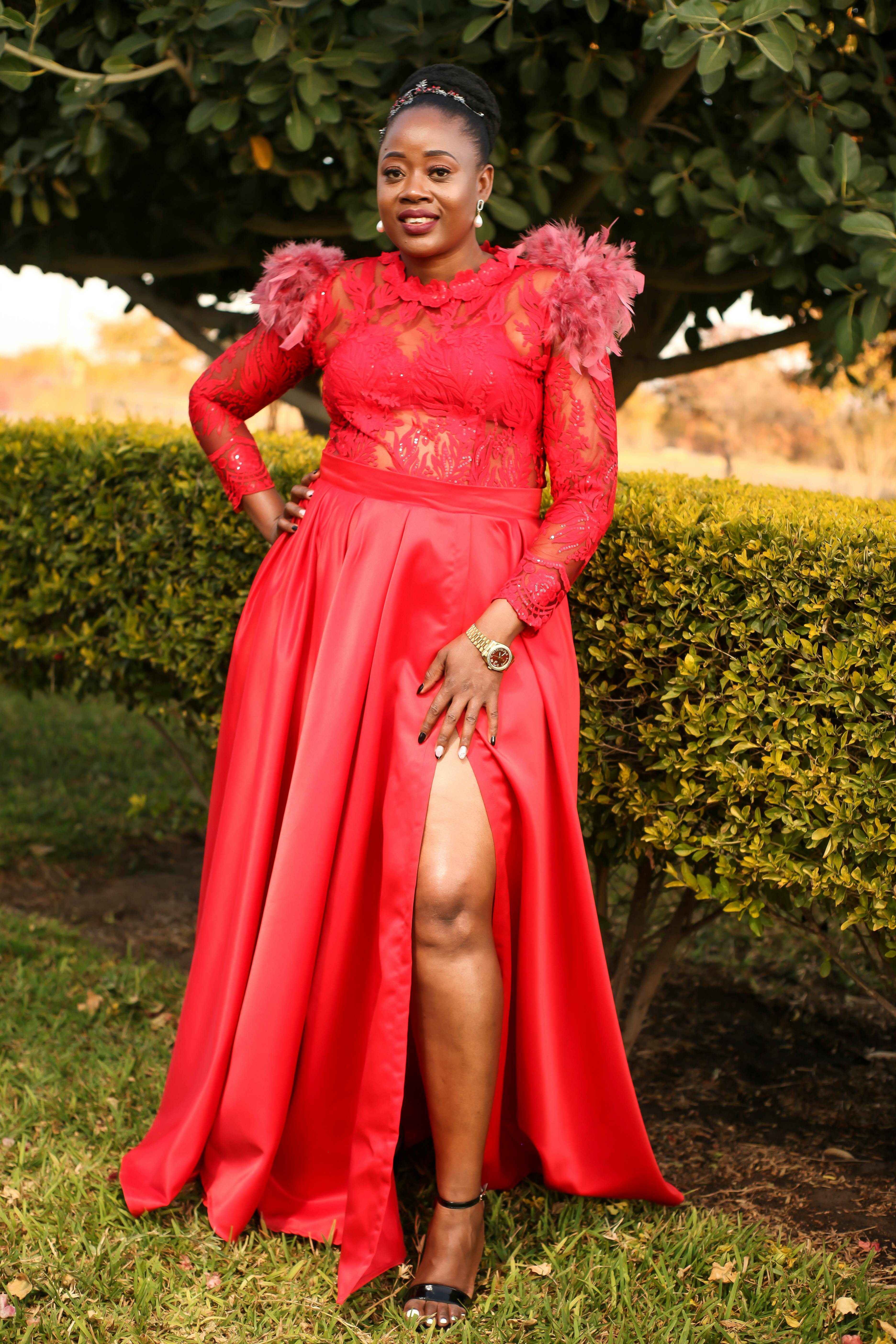 A Woman Wearing Red Dress · Free Stock Photo
