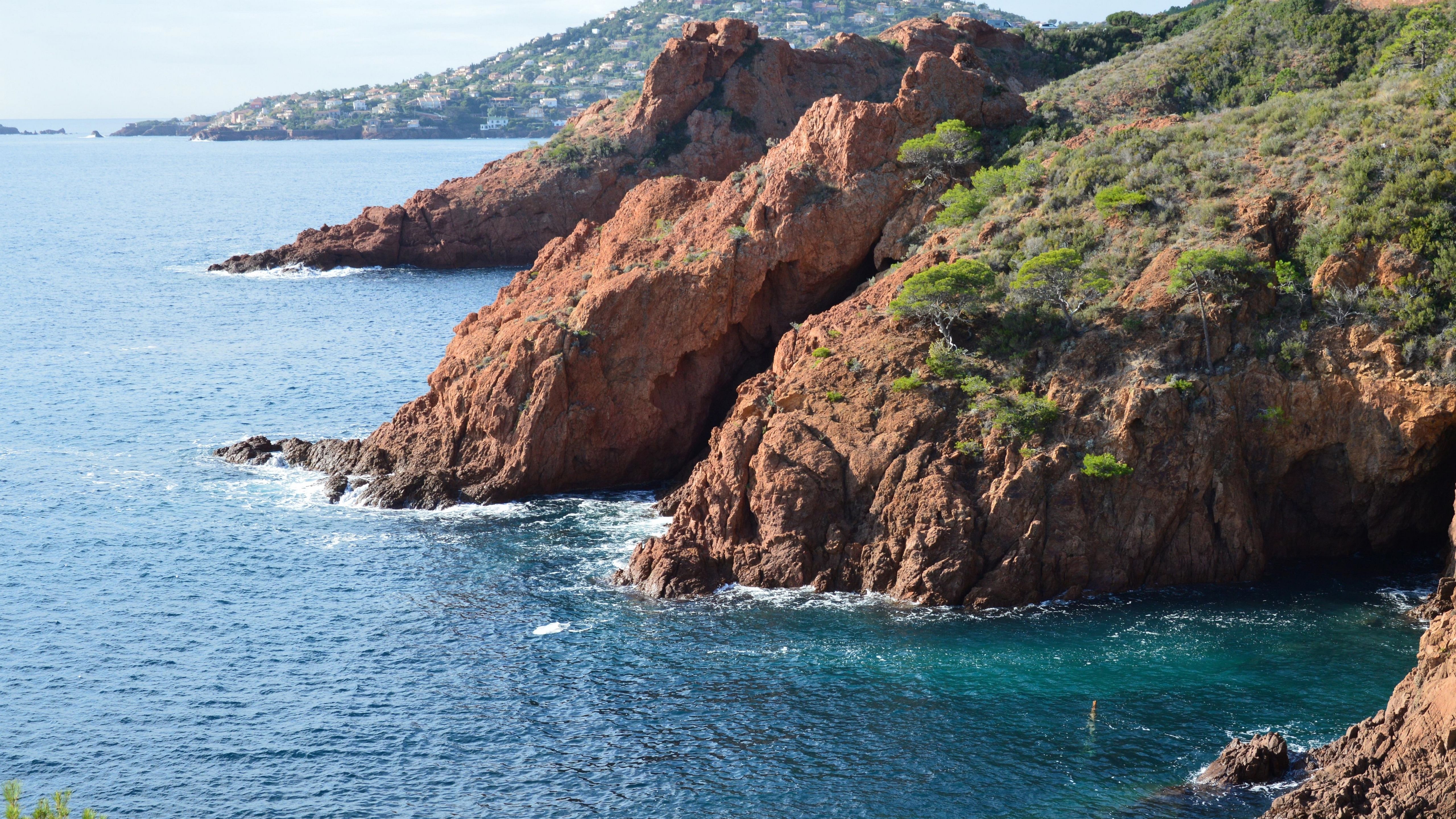 Aerial View of a Rocky Coastal Cliff · Free Stock Photo