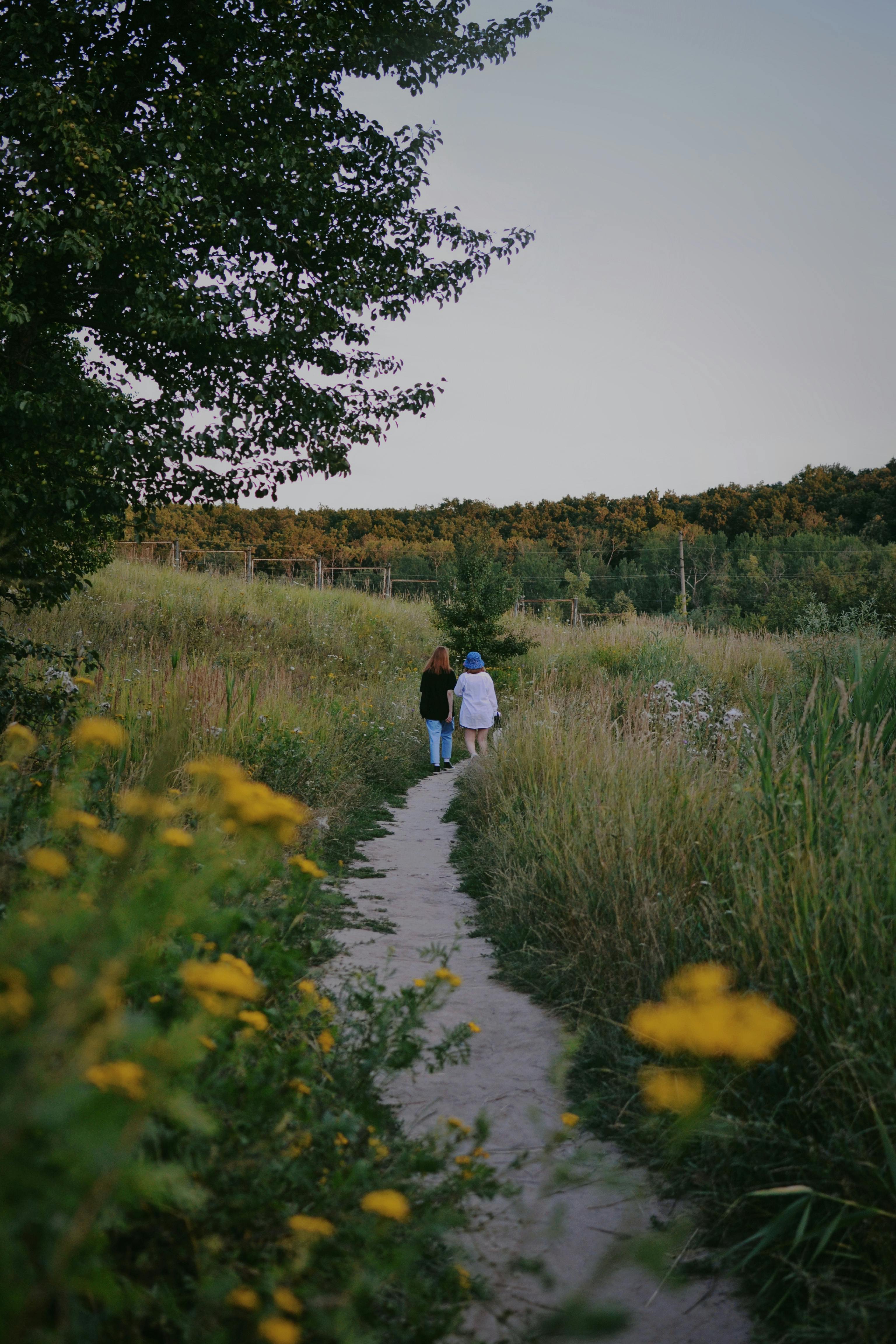 Woman in Green Linen Shirt and Skirt Walking on a Rural Trail · Free ...