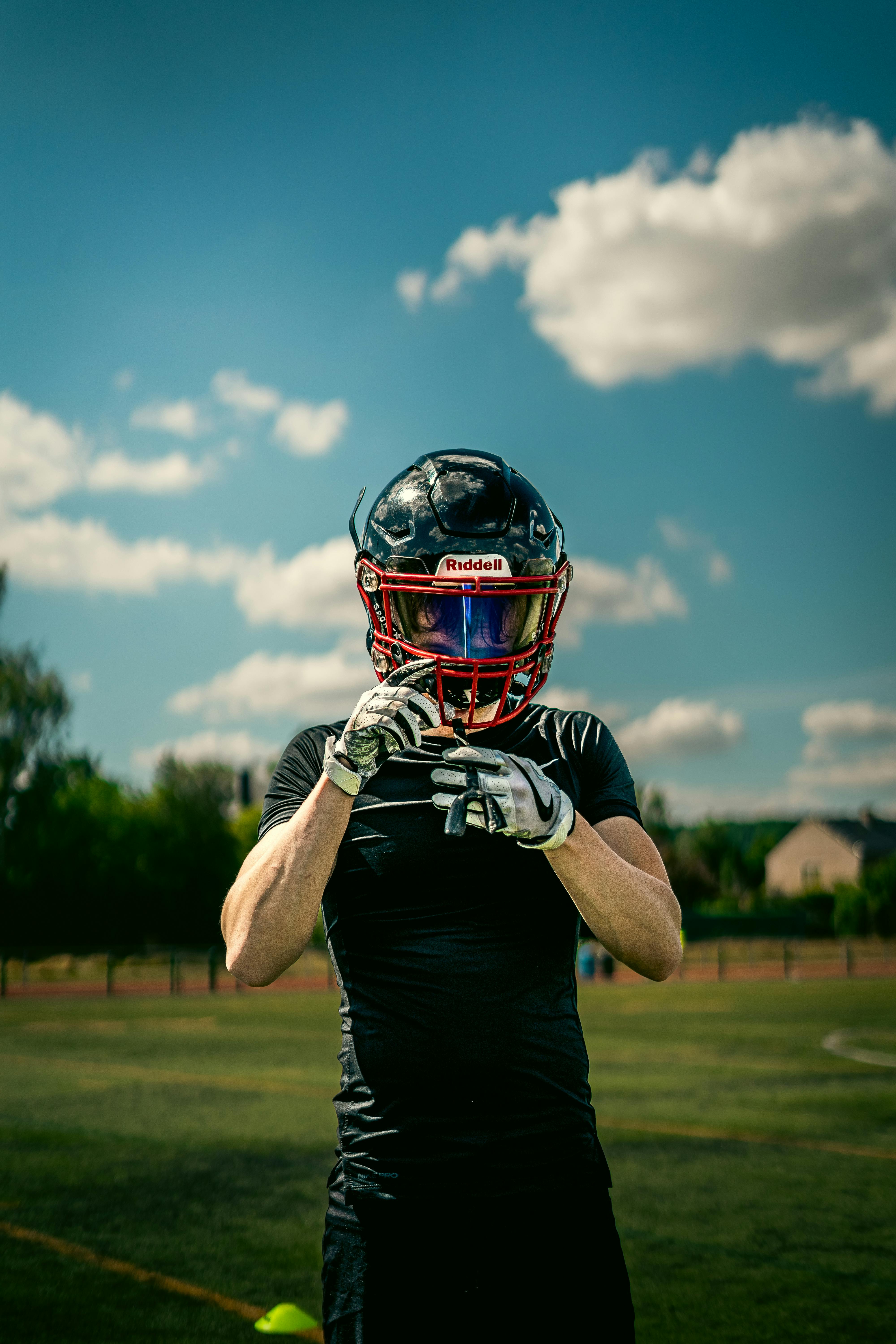A Football Player Wearing a Helmet · Free Stock Photo