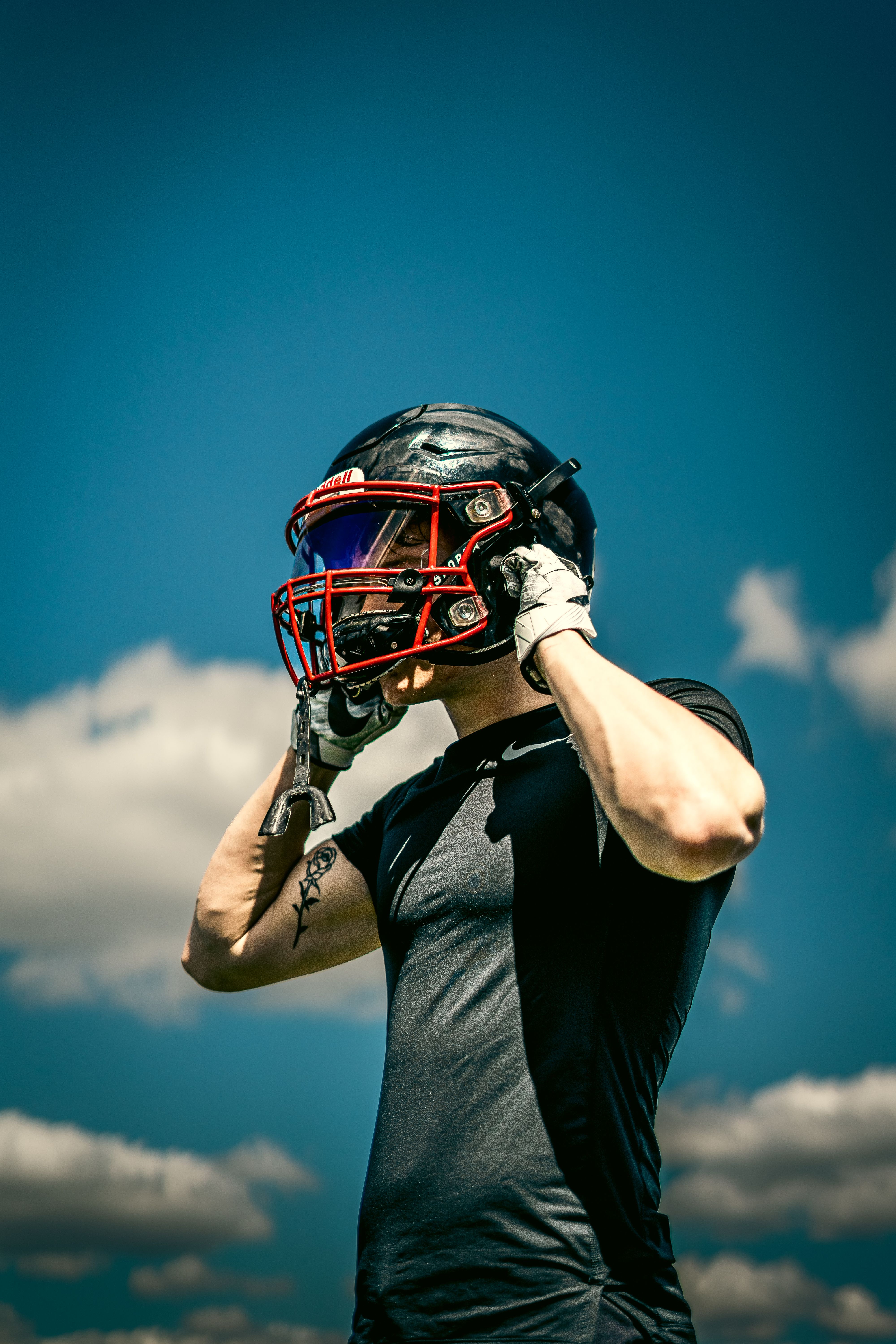 A Football Player Wearing a Helmet · Free Stock Photo