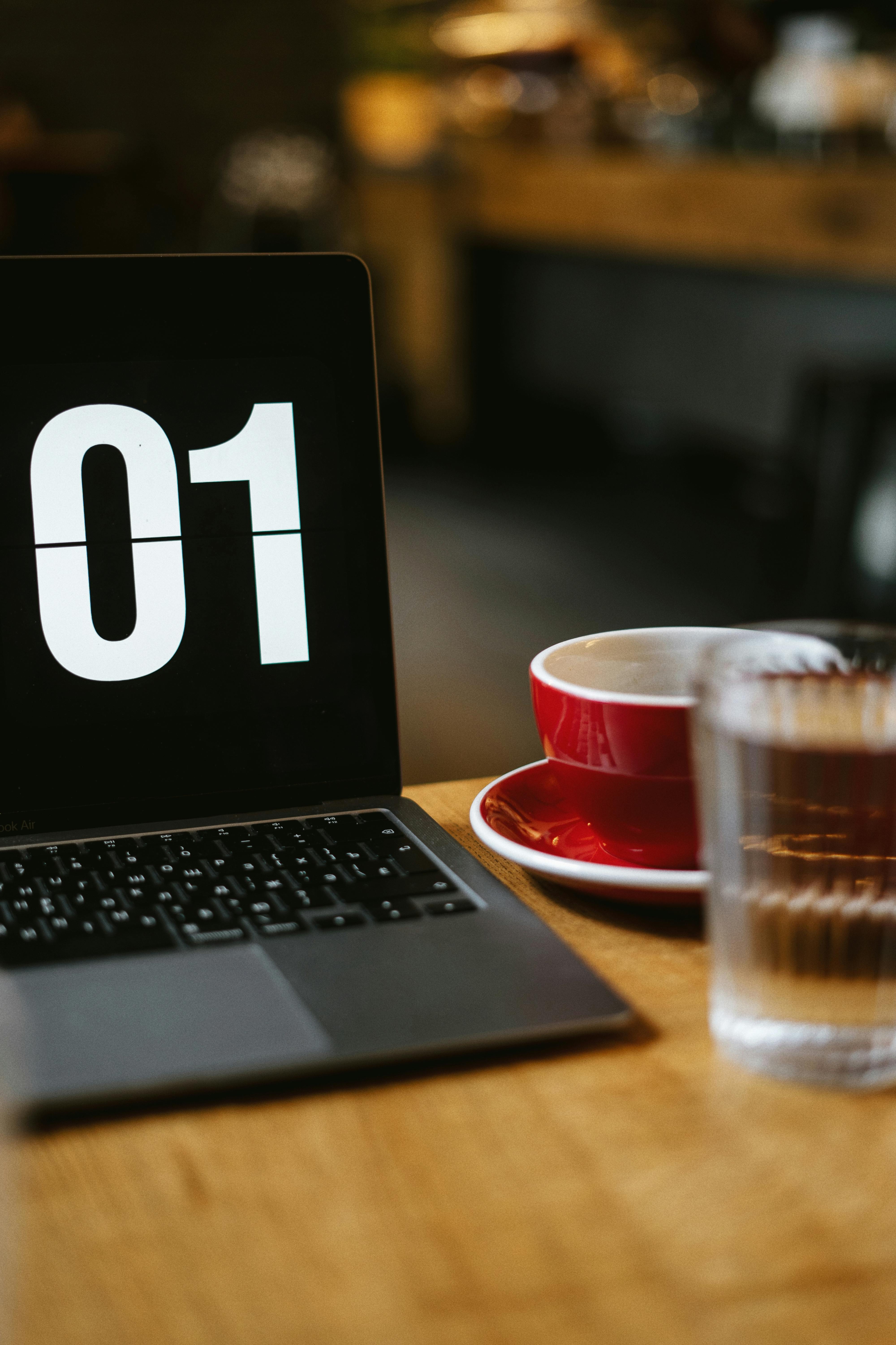 Coffee and Laptop on Wooden Table · Free Stock Photo