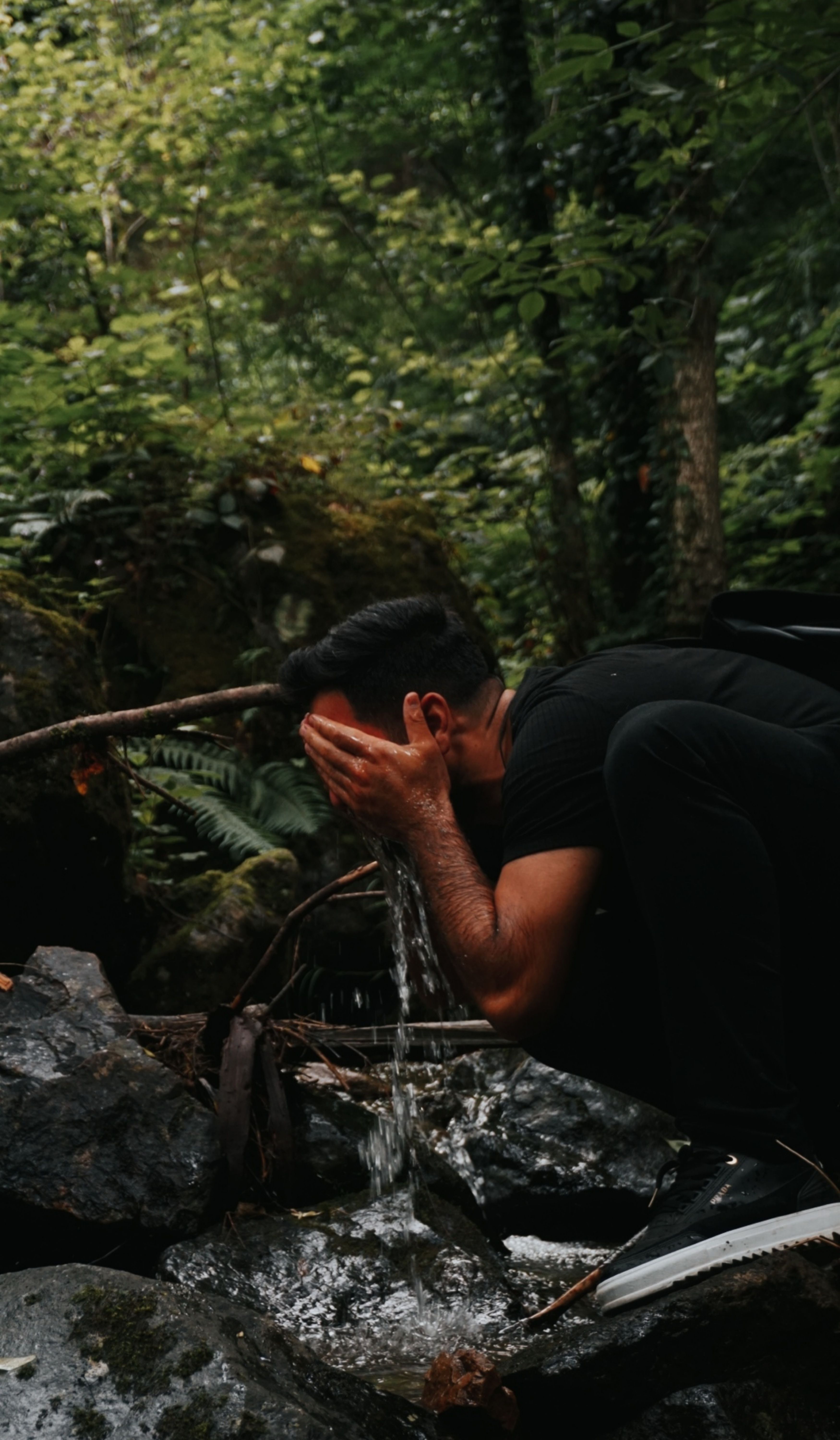 Wide Shot Of A Man Washing Himself On A Waterfall Bodyscrub Photos ...