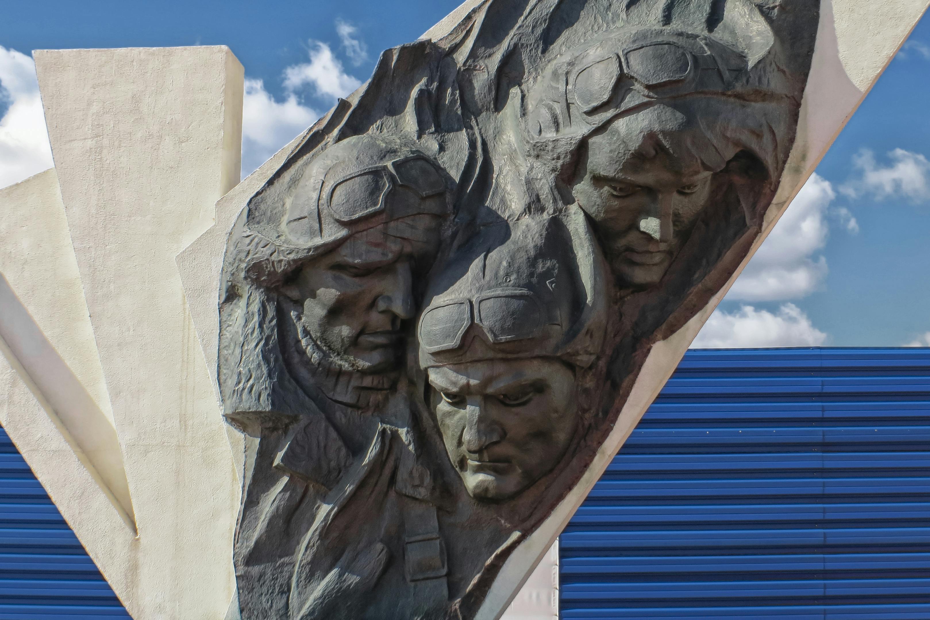 Gray Concrete Human Face Carved Statue · Free Stock Photo