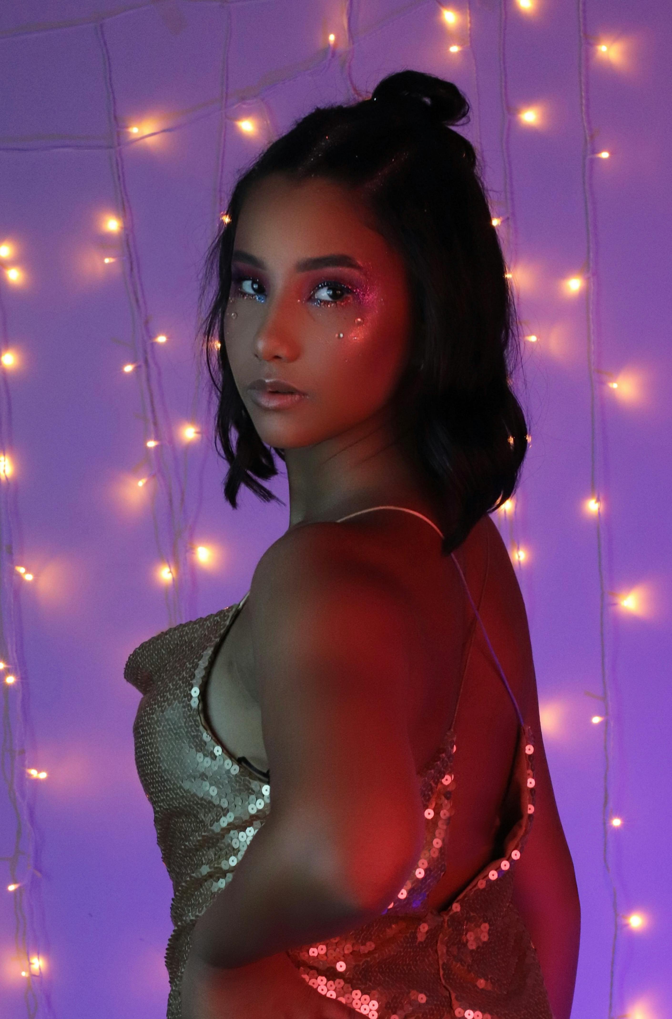 A Woman Looking Over Shoulder · Free Stock Photo