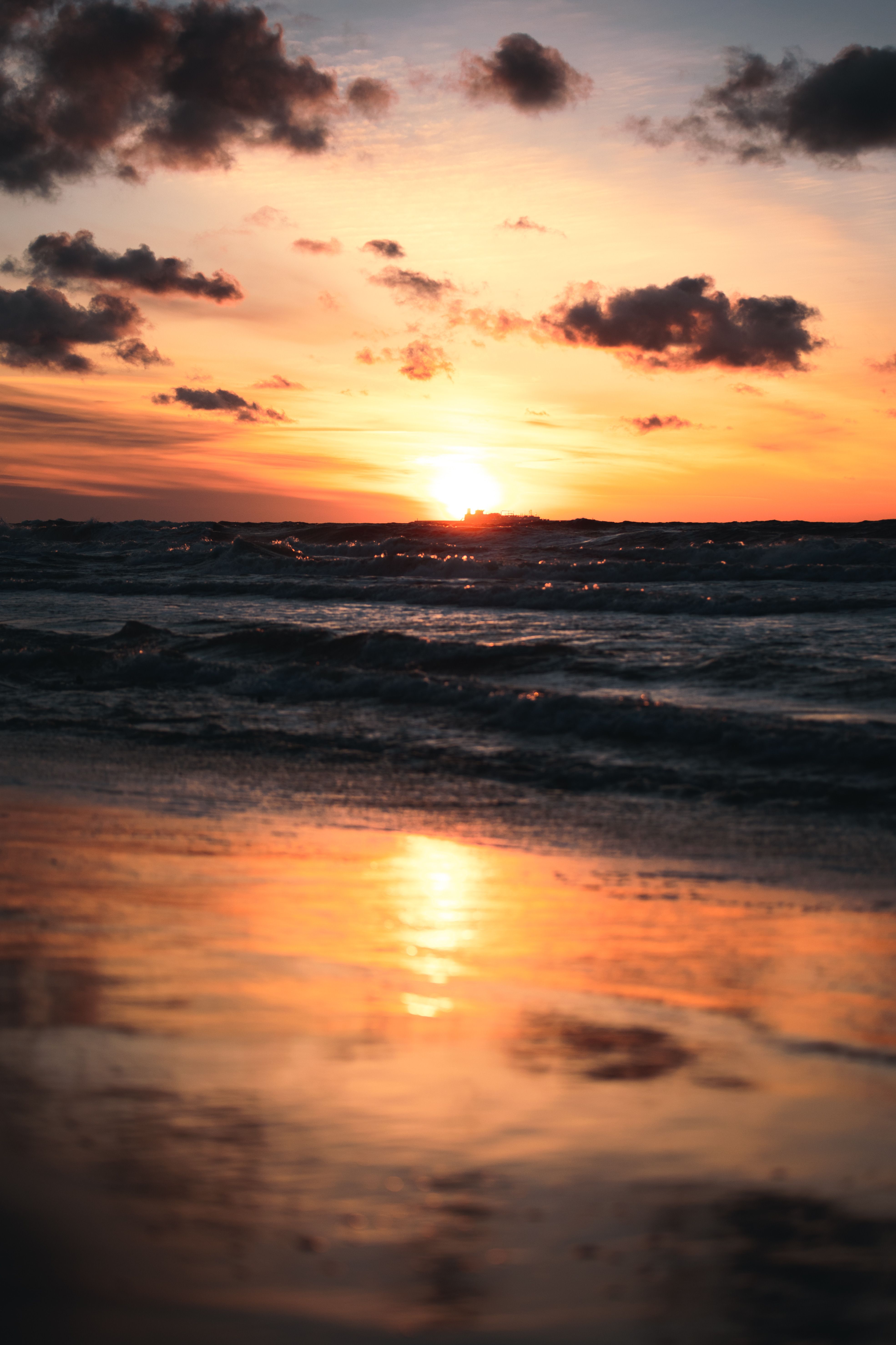 View of a Sea Waves During Sunset · Free Stock Photo