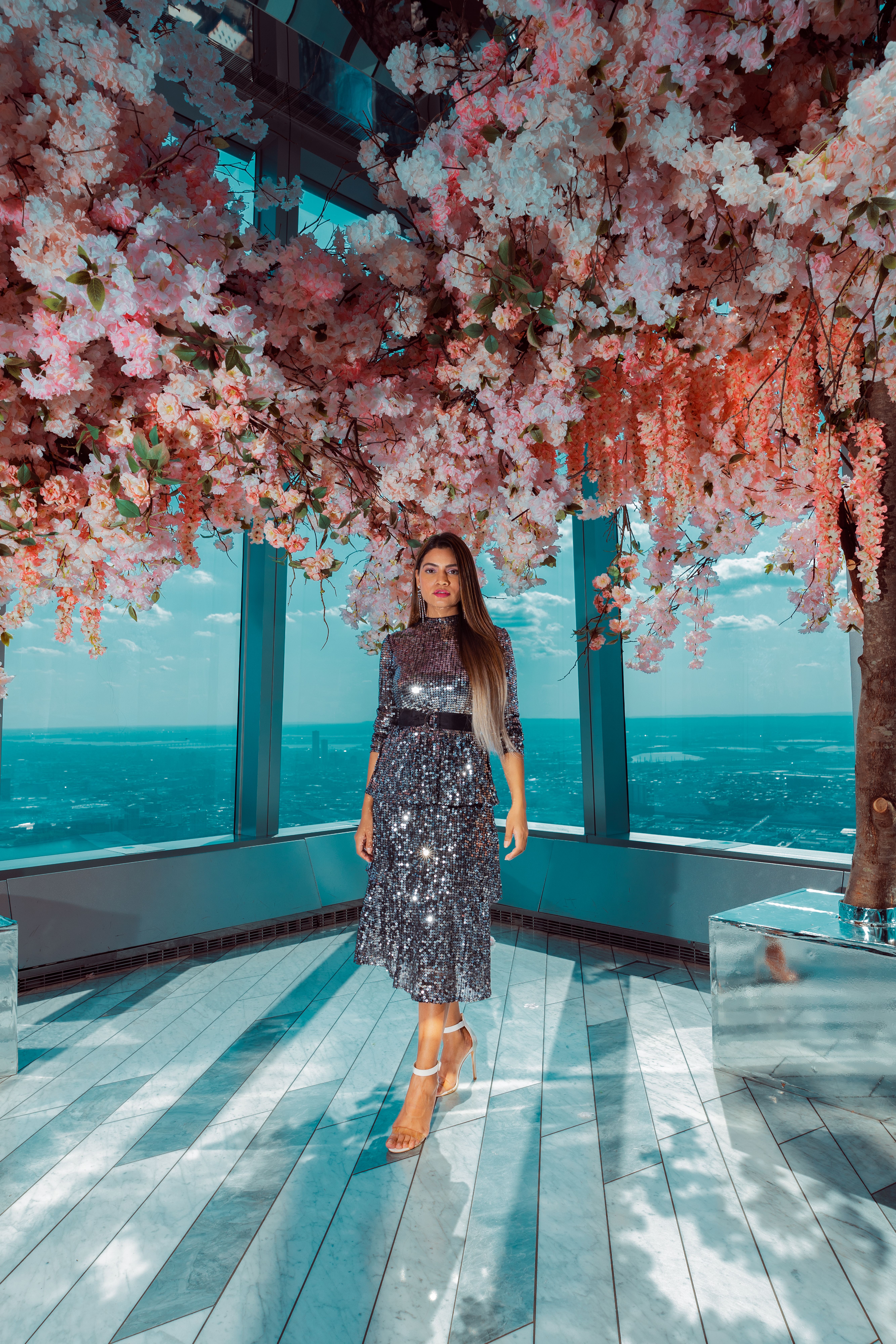 A Woman Wearing Dress Standing Under the Flowers · Free Stock Photo