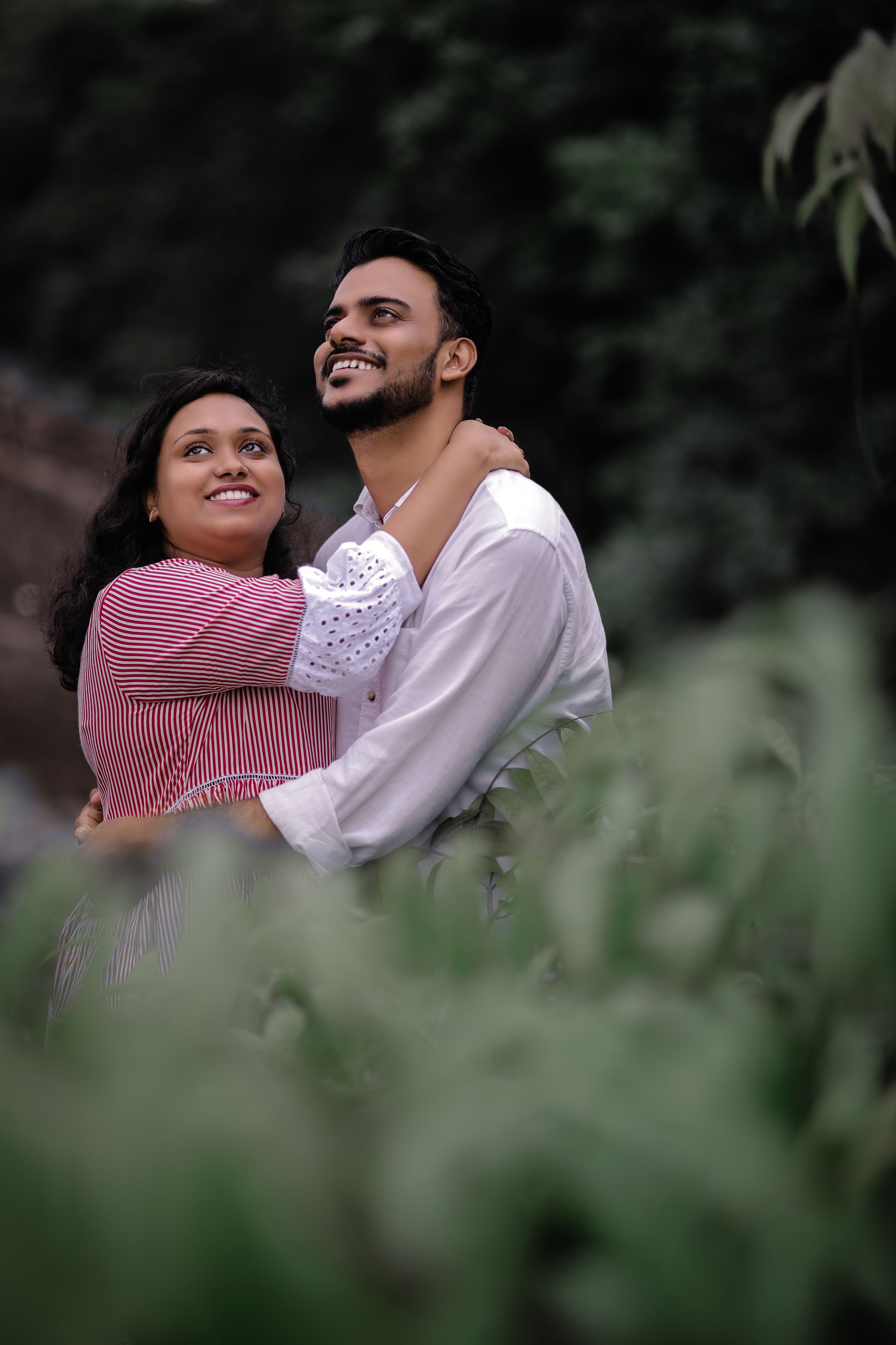 Man in a Uniform Embracing a Woman · Free Stock Photo