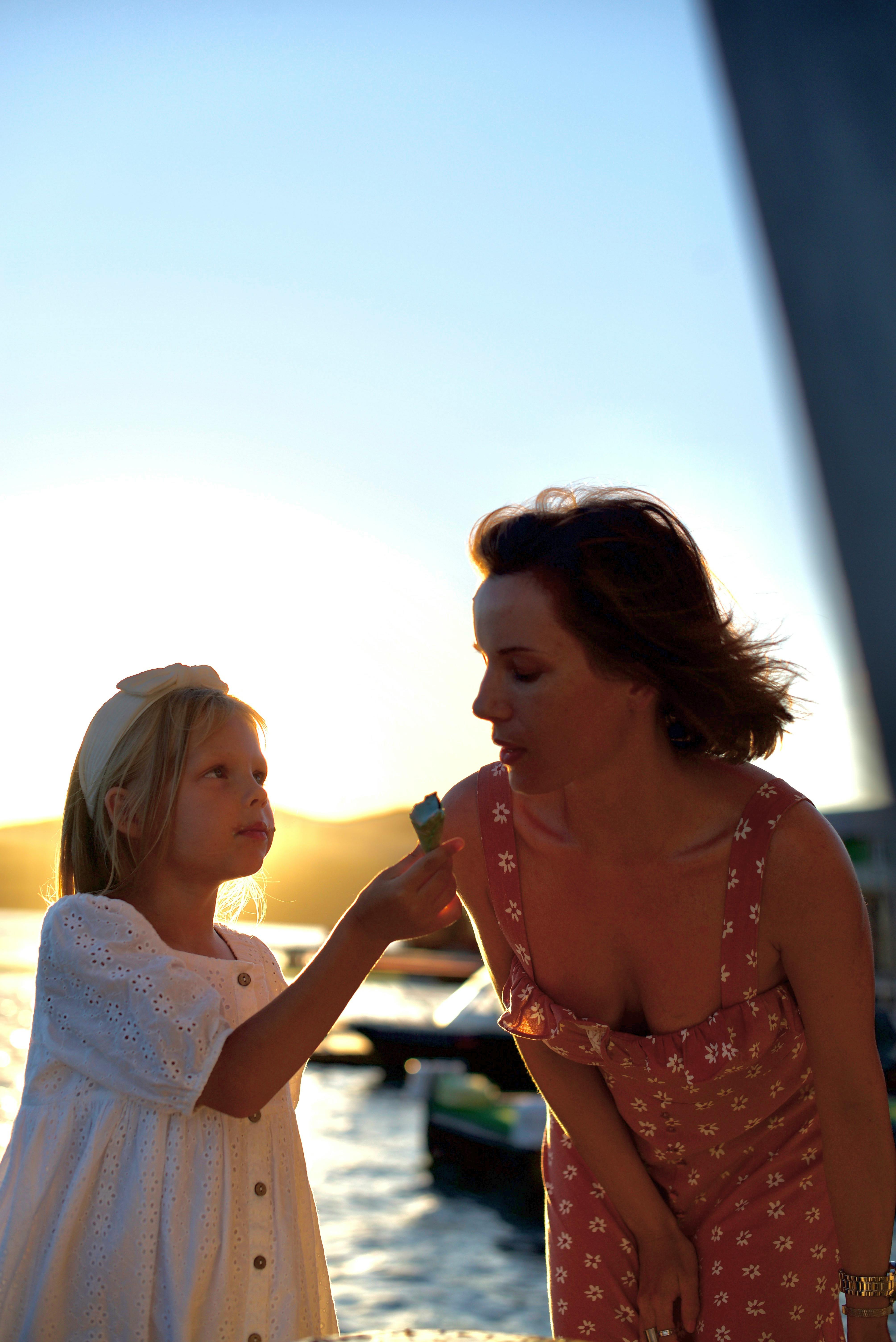 Woman in Pink Floral Dress · Free Stock Photo