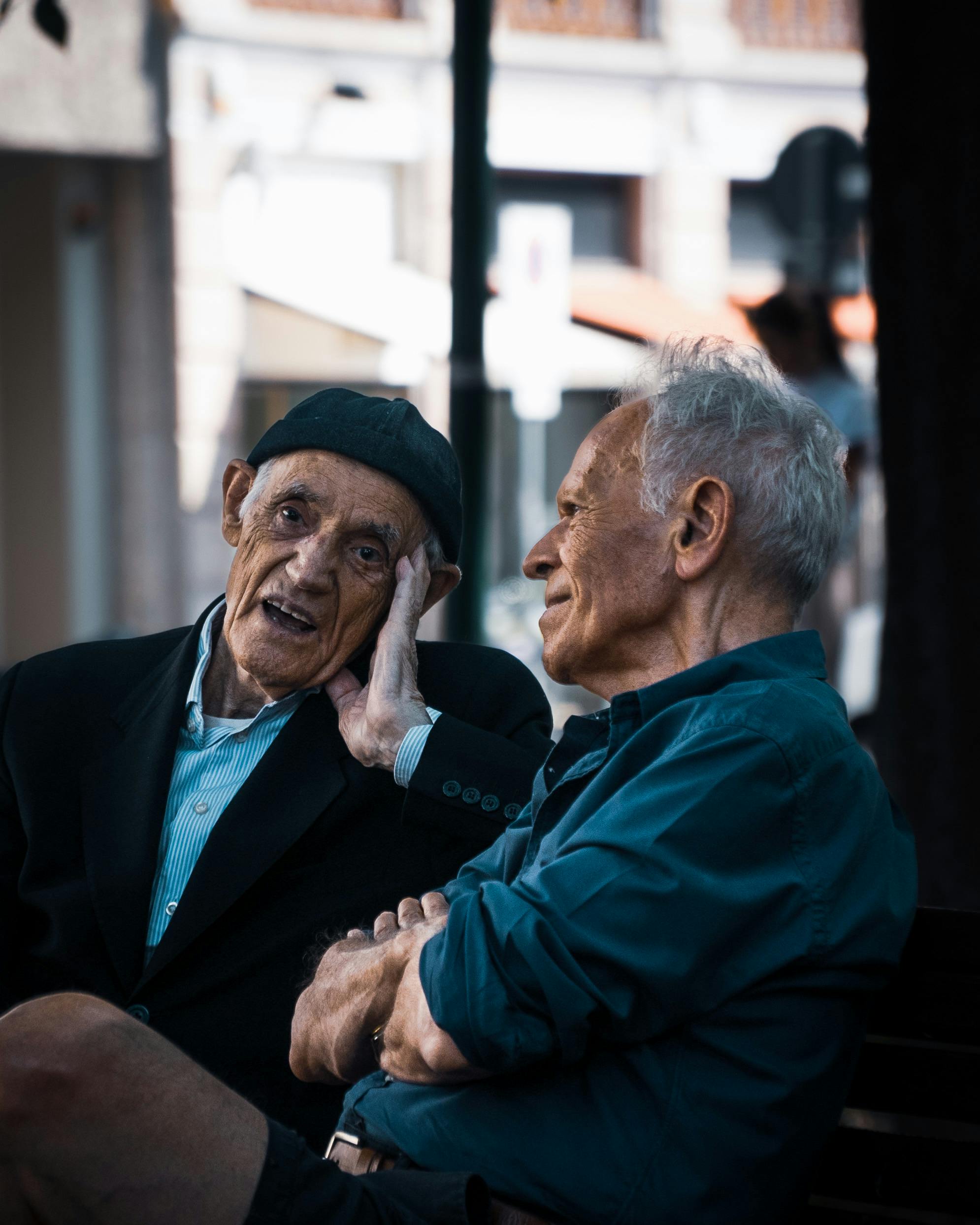 Two Men Talking Together · Free Stock Photo