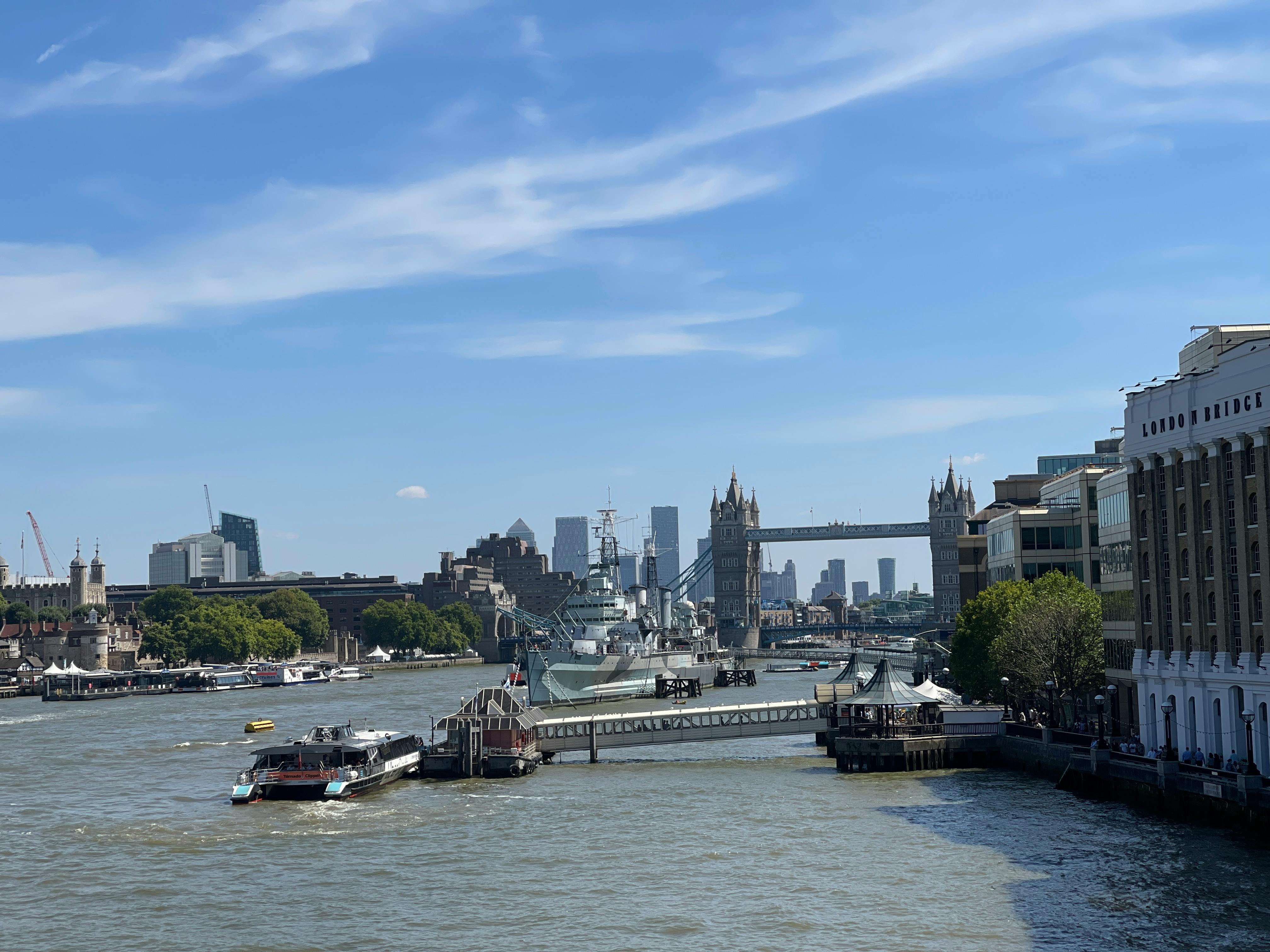 Modern Buildings by the River · Free Stock Photo