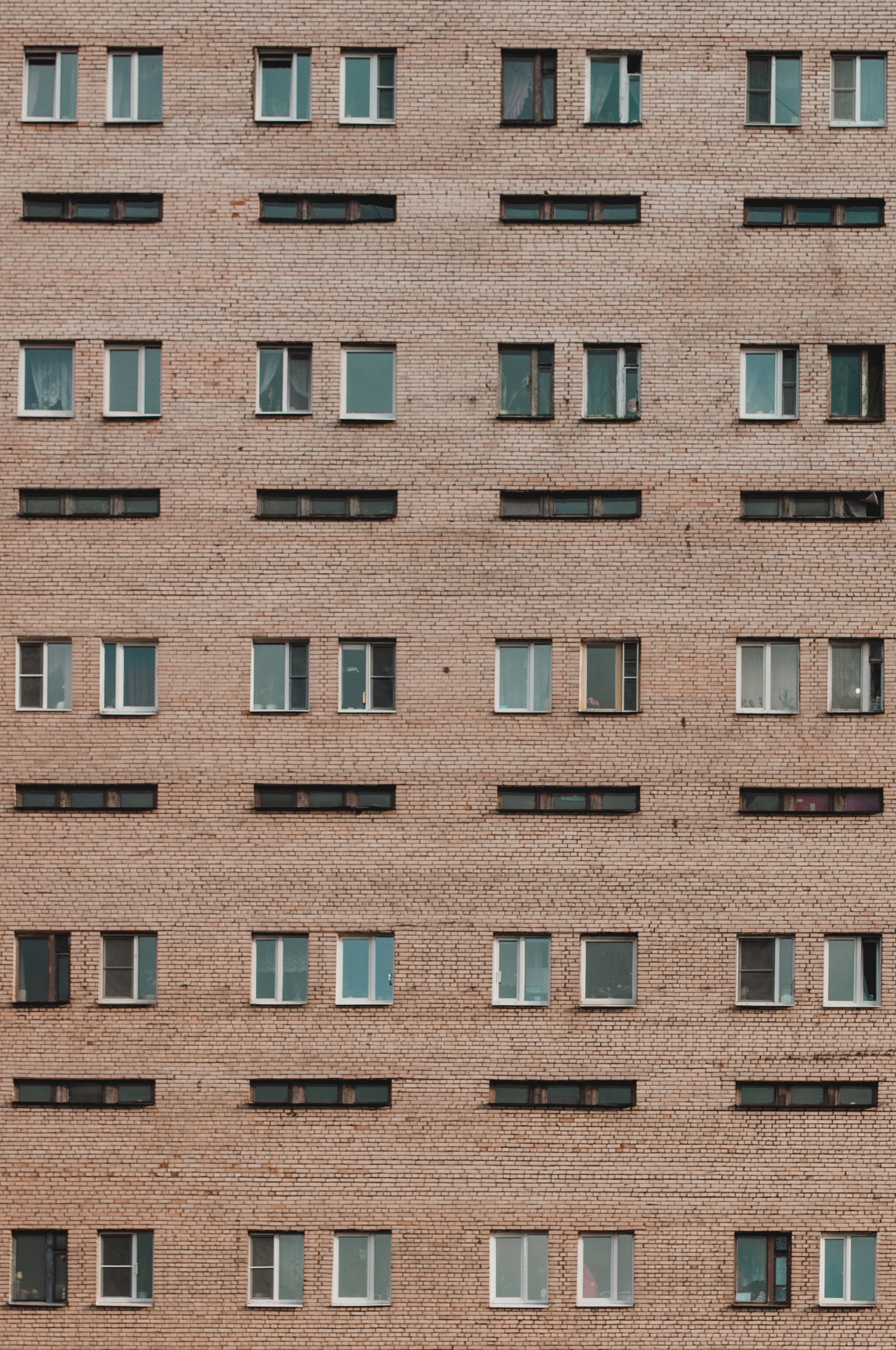 A Brick Building With Windows · Free Stock Photo