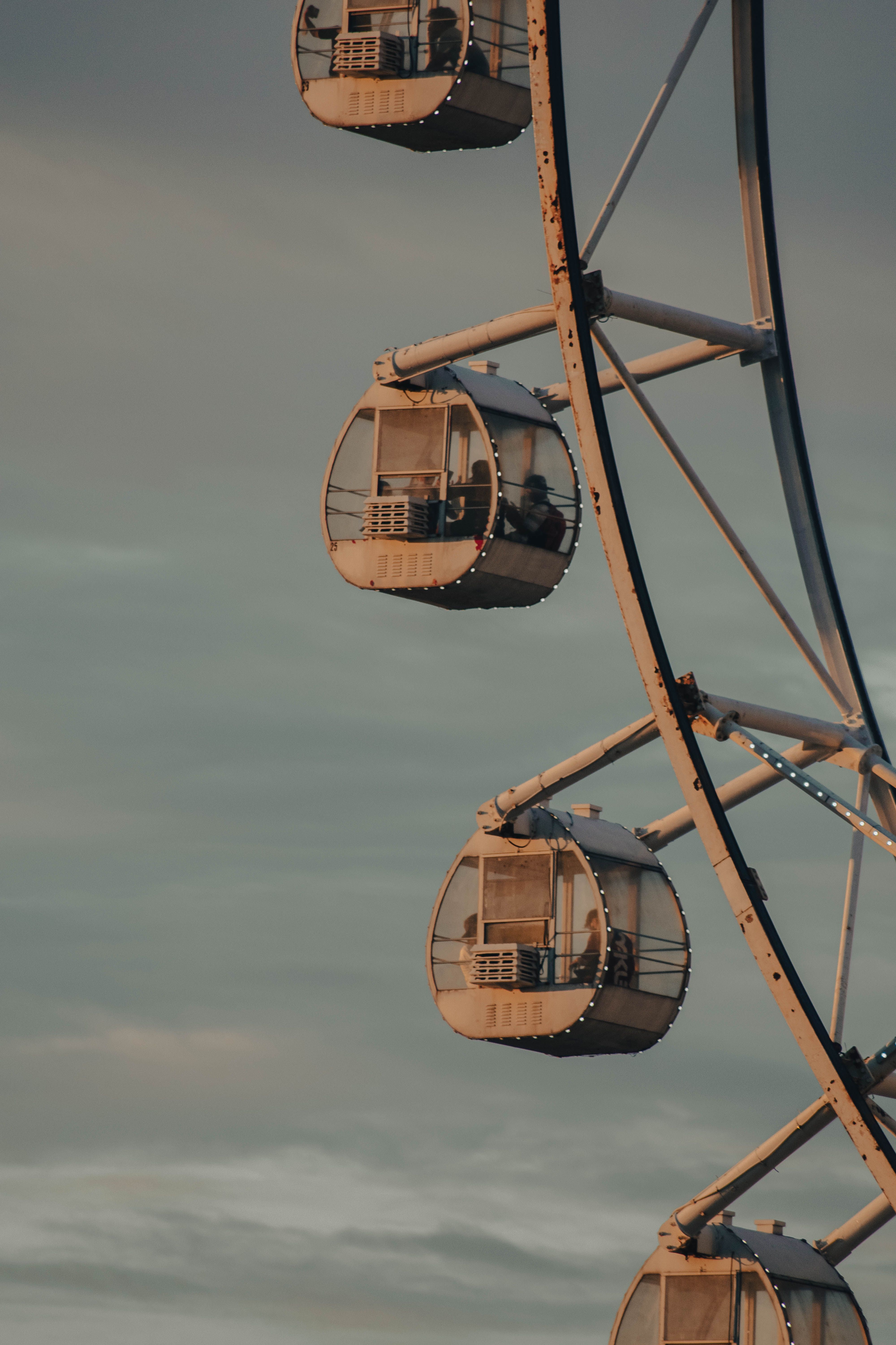 People Riding a Ferris Wheel · Free Stock Photo
