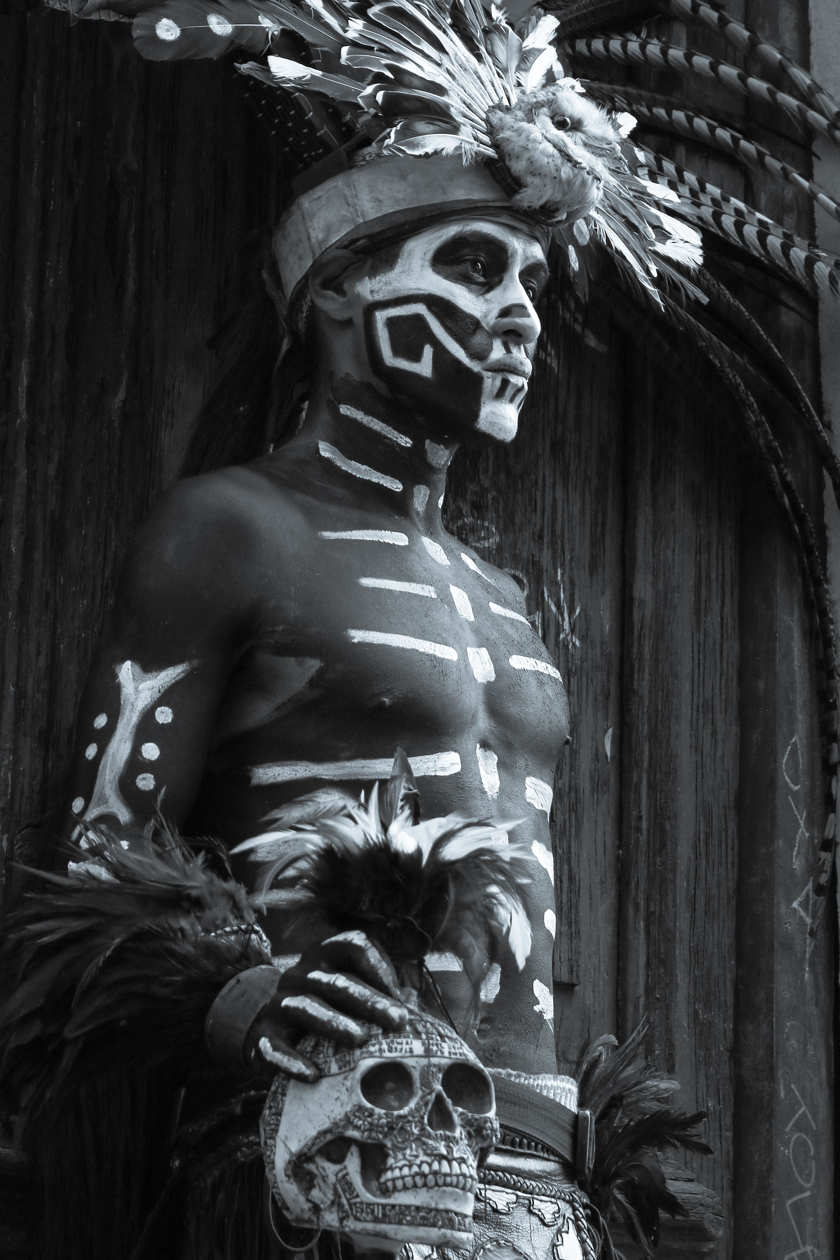 A Man Wearing a Costume and a Face Paint · Free Stock Photo