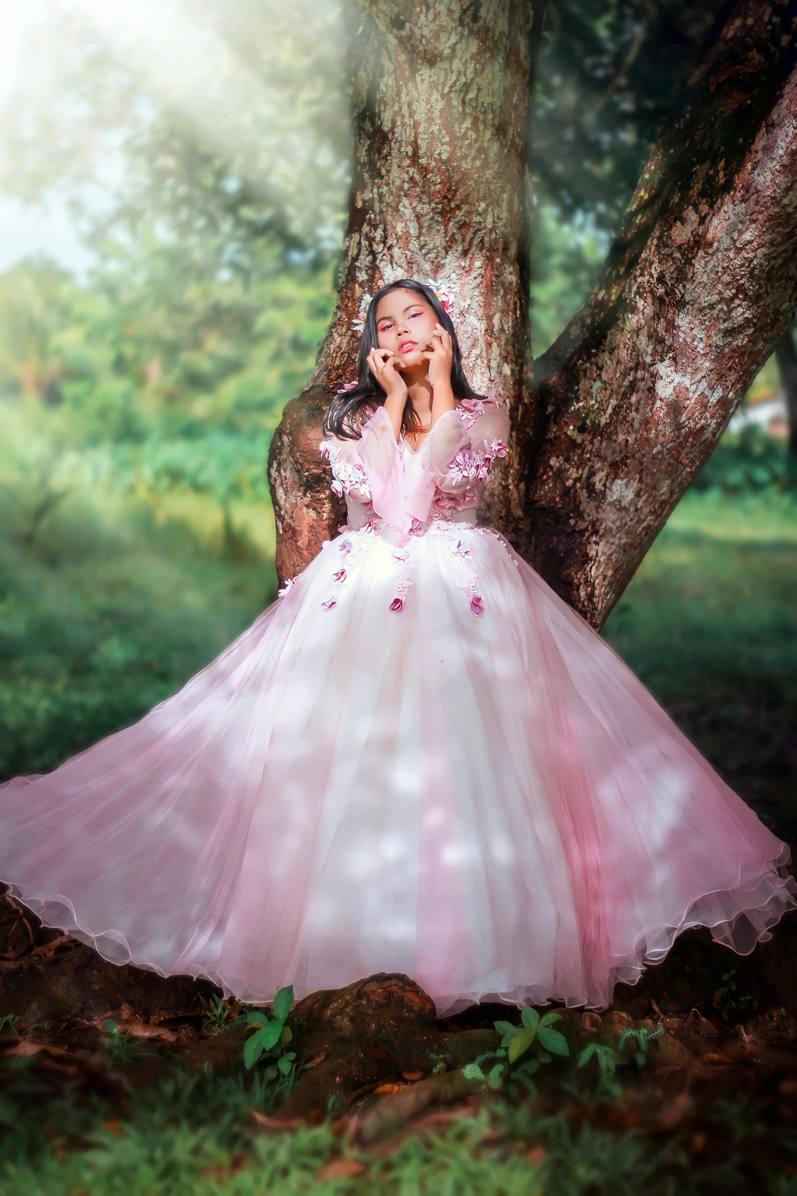 A Woman Wearing a Pink Floral Gown · Free Stock Photo