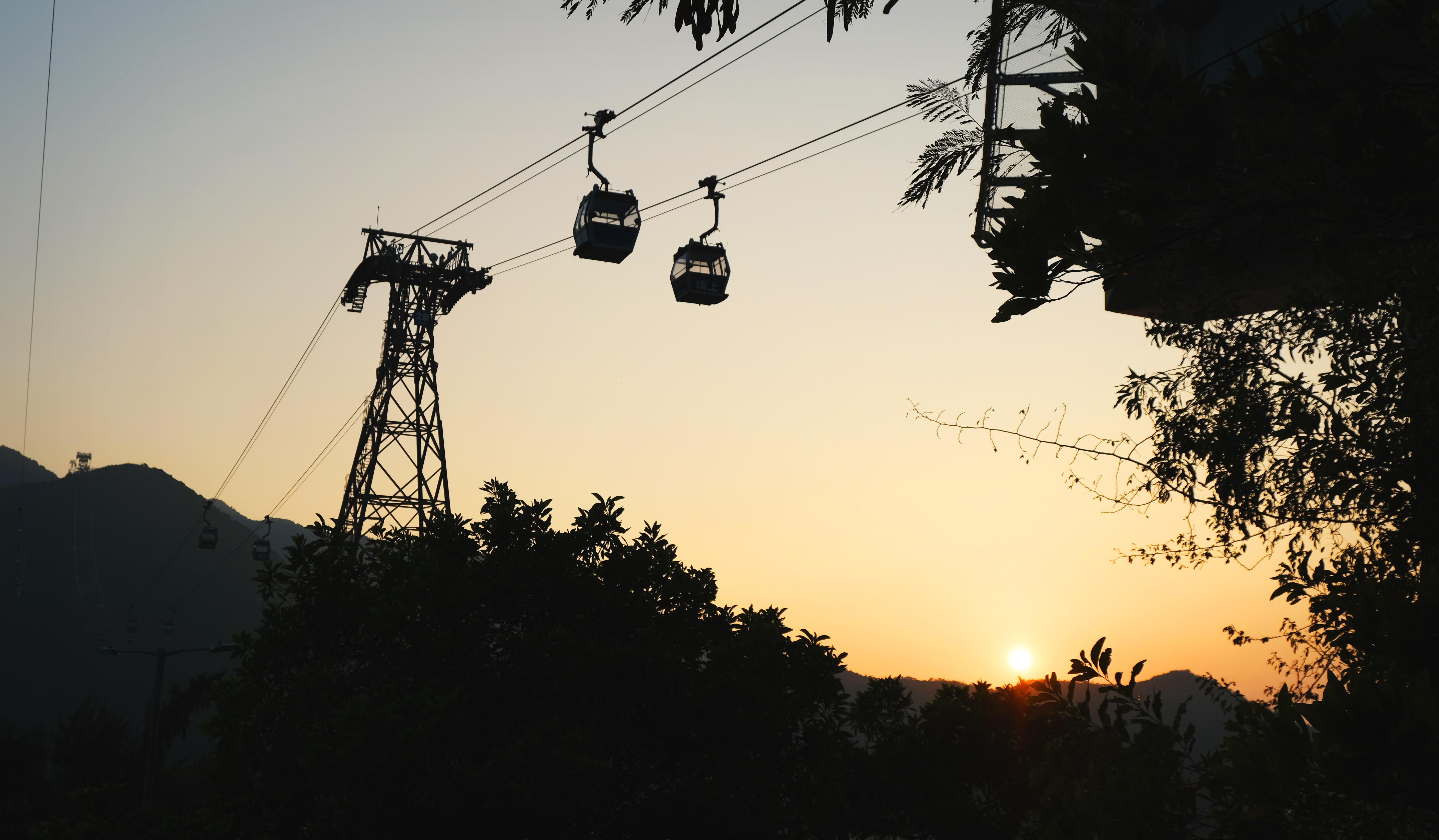 Silhouette of Cable Cars during Sunset · Free Stock Photo