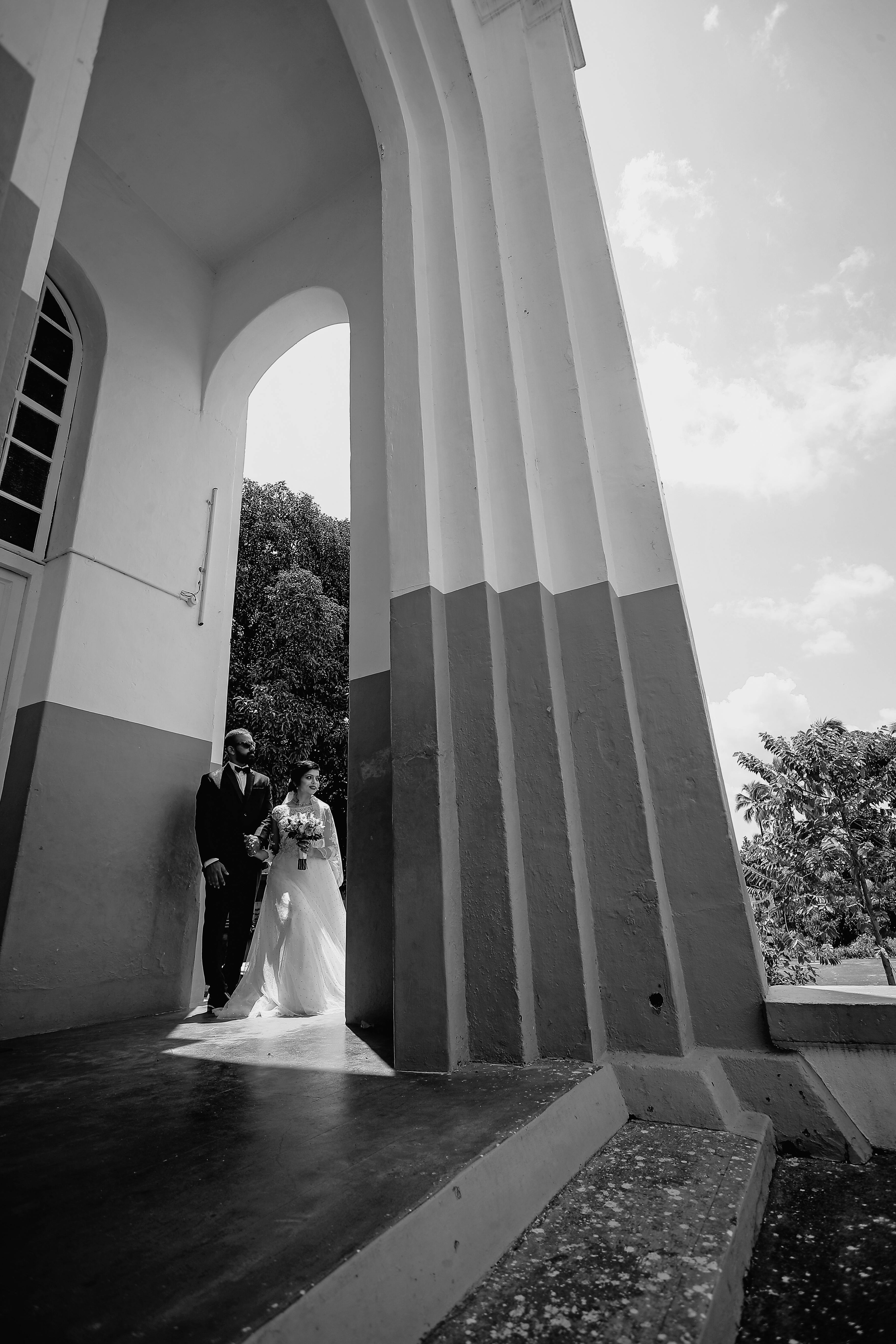 A Groom Singing while Walking with His Bride · Free Stock Photo