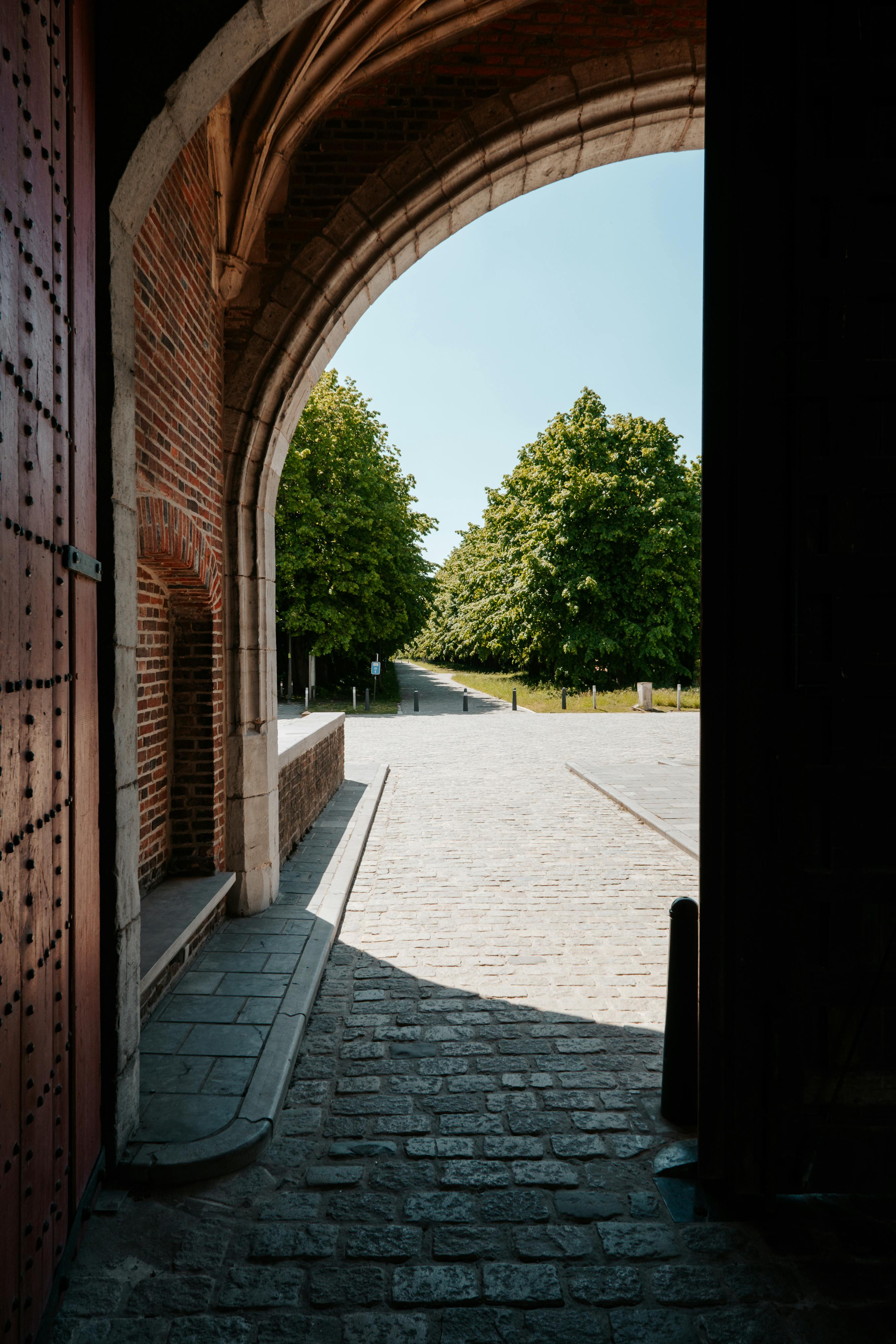Sidewalk under Arch · Free Stock Photo