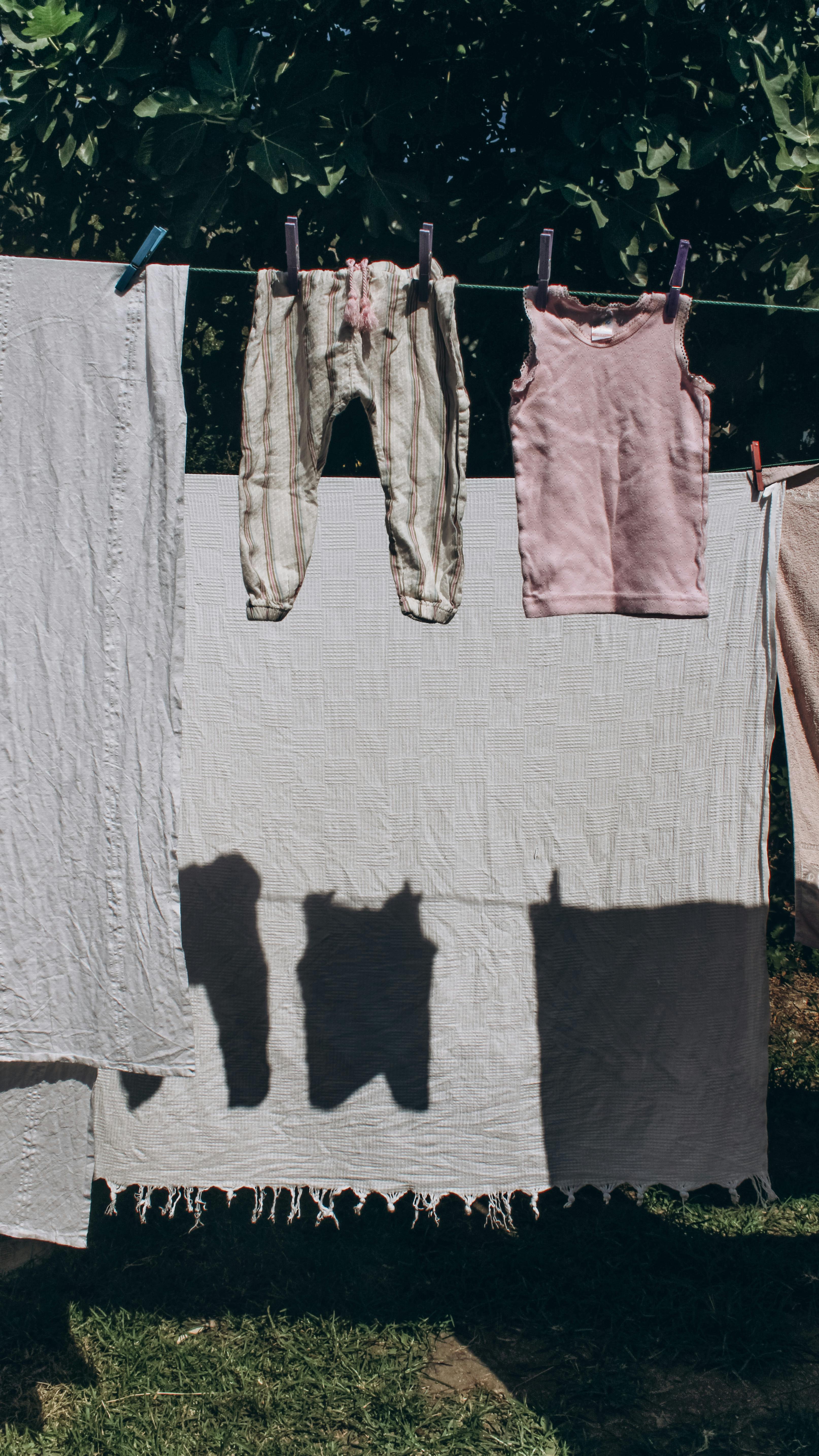 Clothes Hanging on Clothesline · Free Stock Photo