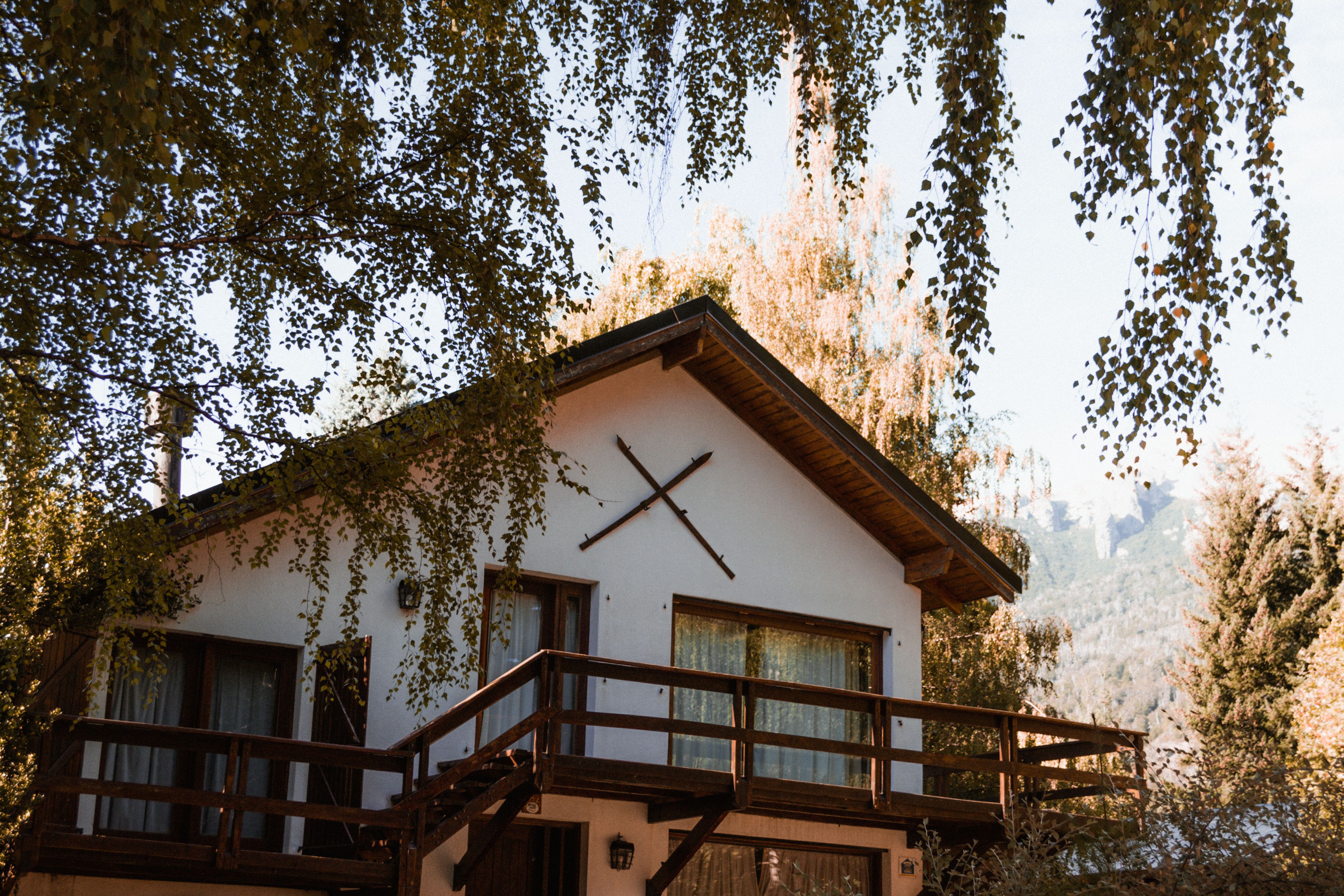 Wooden House Beside Green Trees · Free Stock Photo