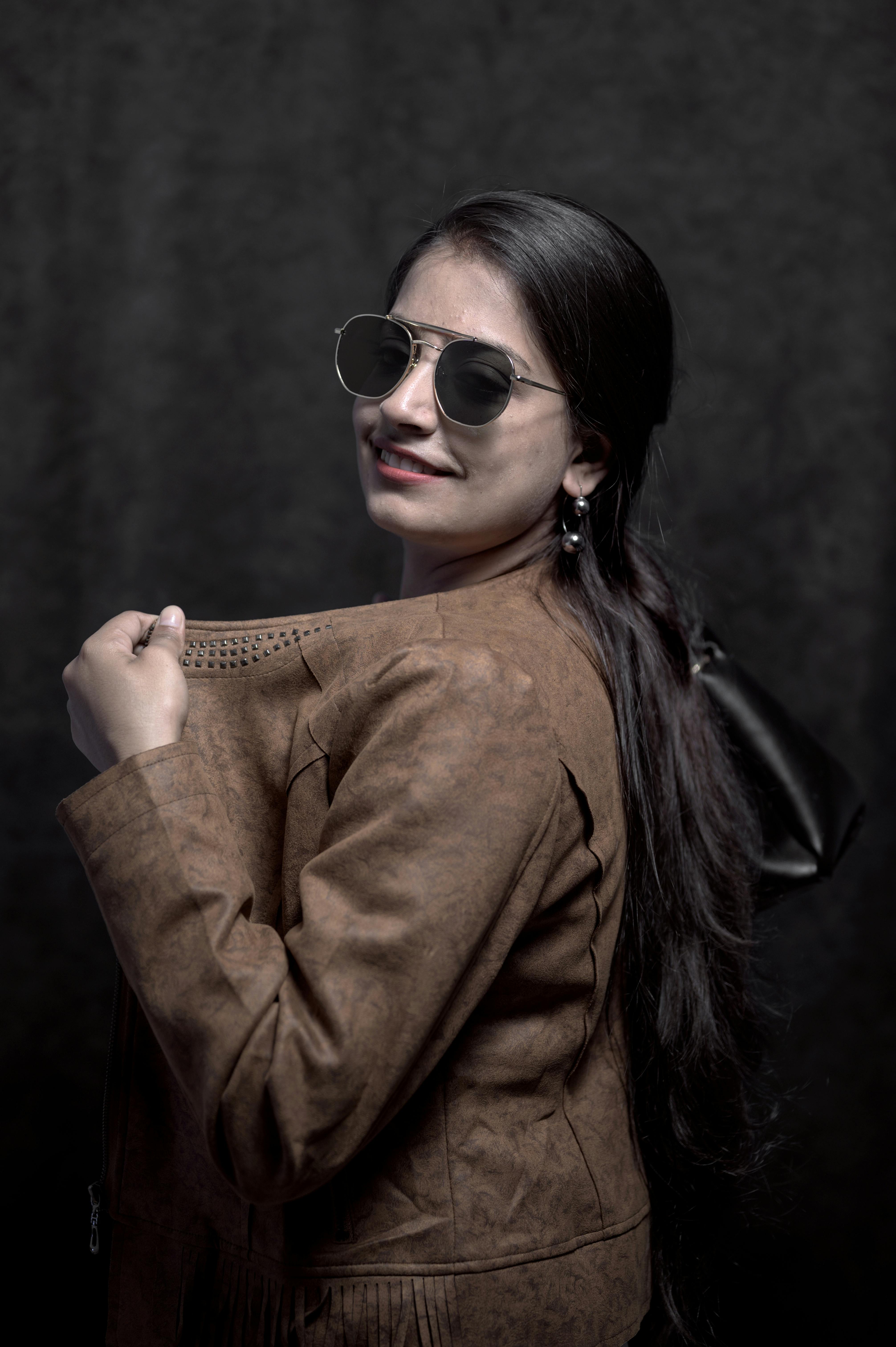 Model Posing in Leather Jacket and Shorts · Free Stock Photo