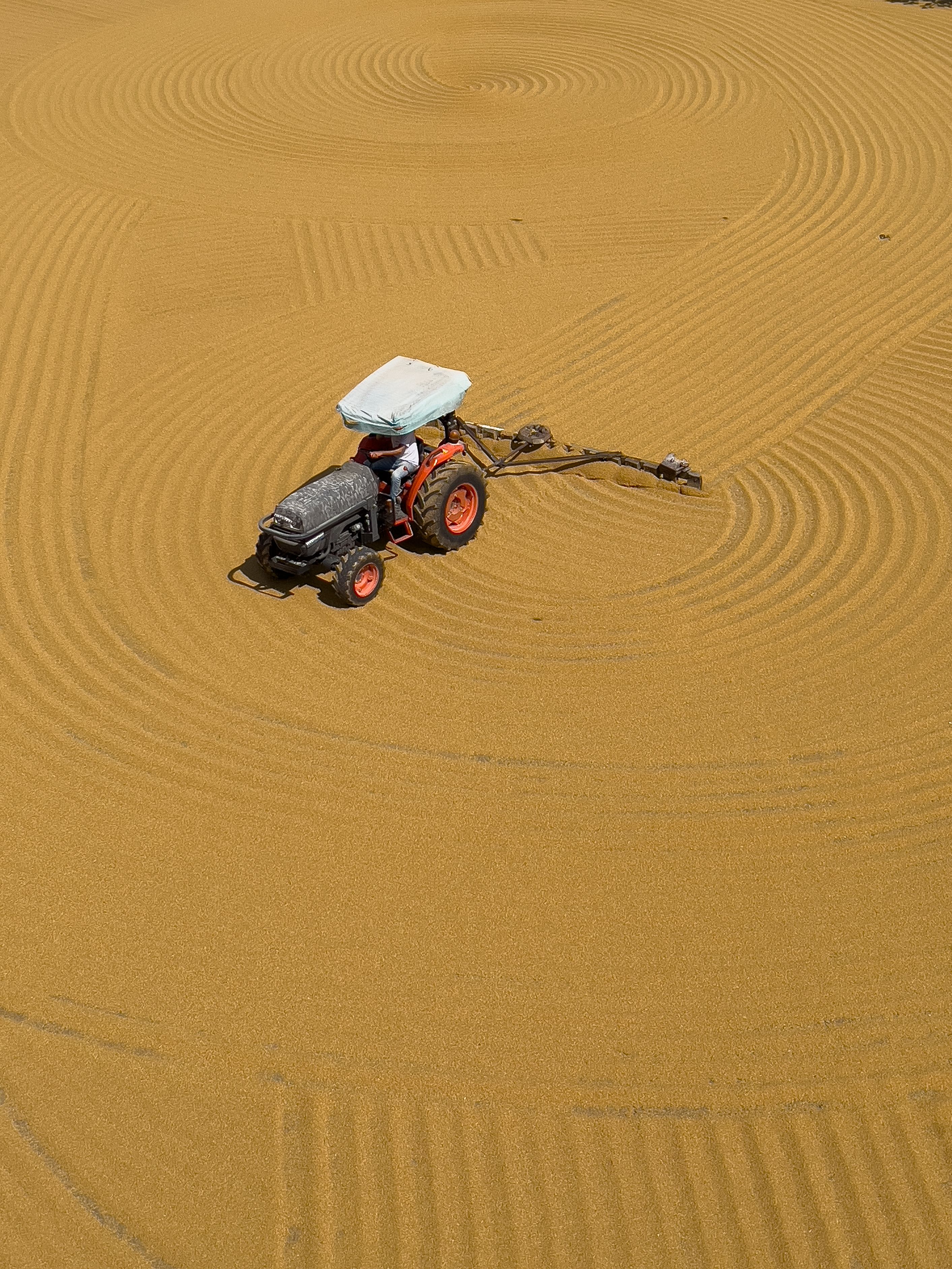 Tractor Plowing Sand on the Beach · Free Stock Photo