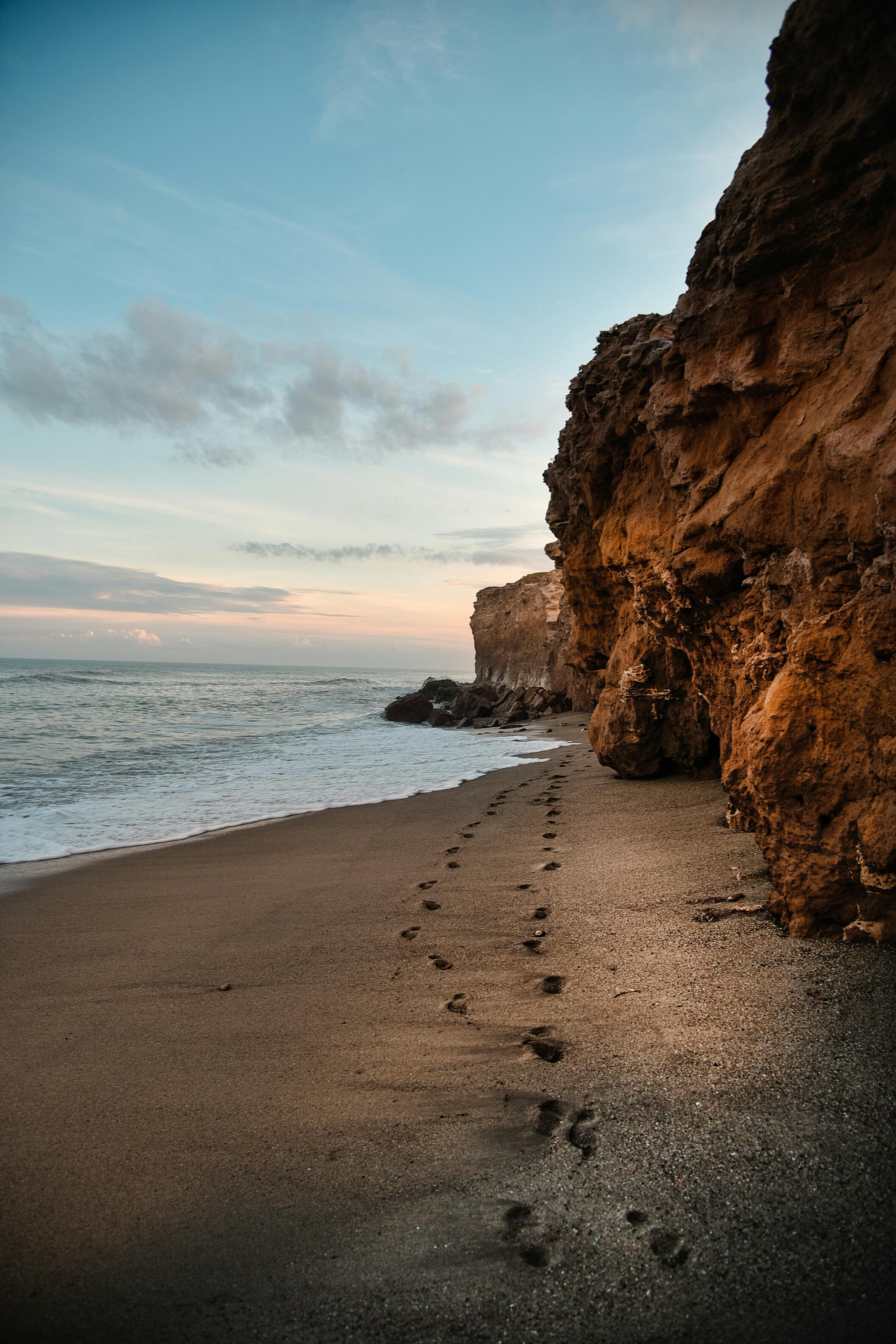 Rocks over Beach on Sea Shore · Free Stock Photo