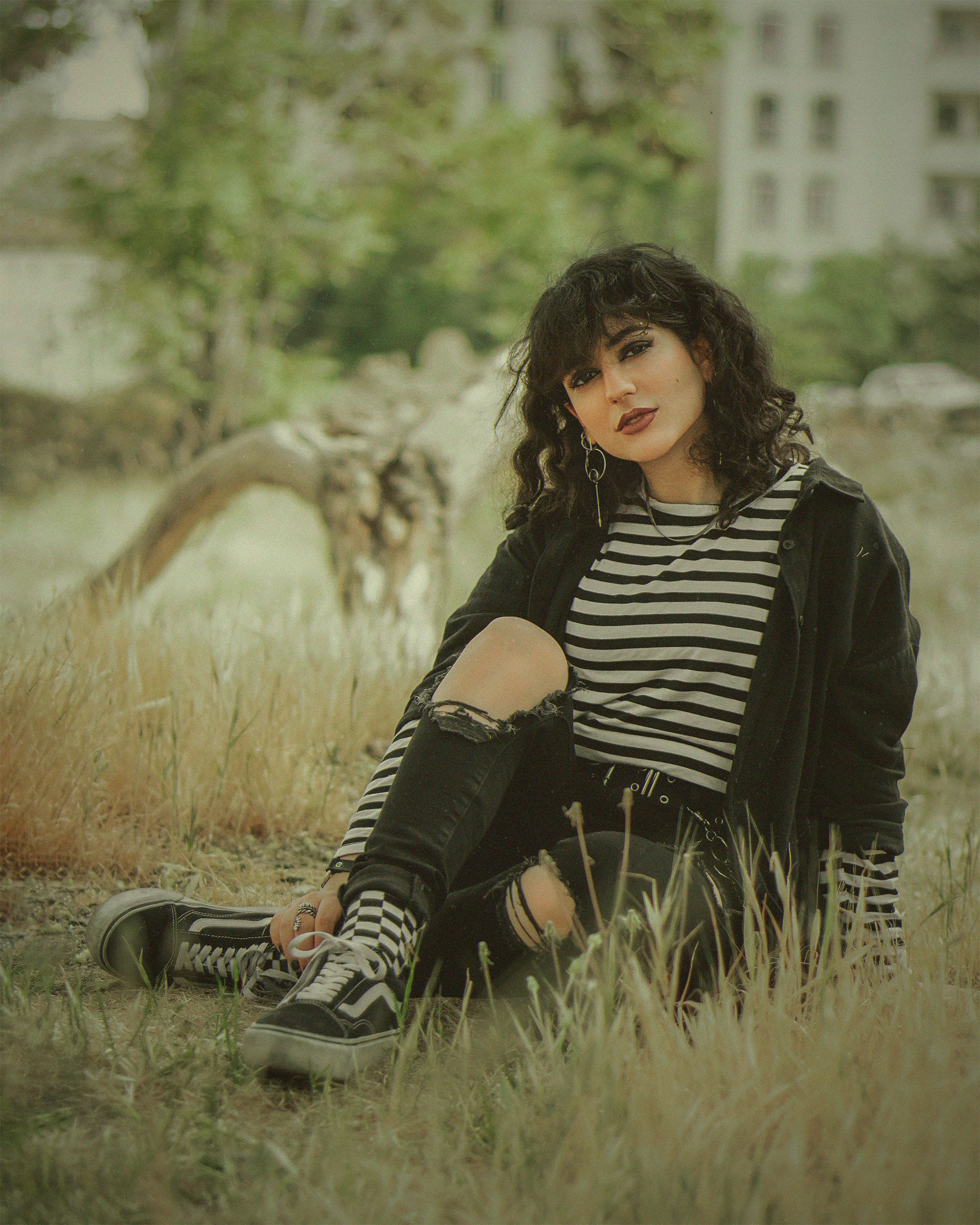 Woman Sitting on the Ground While Looking Up · Free Stock Photo