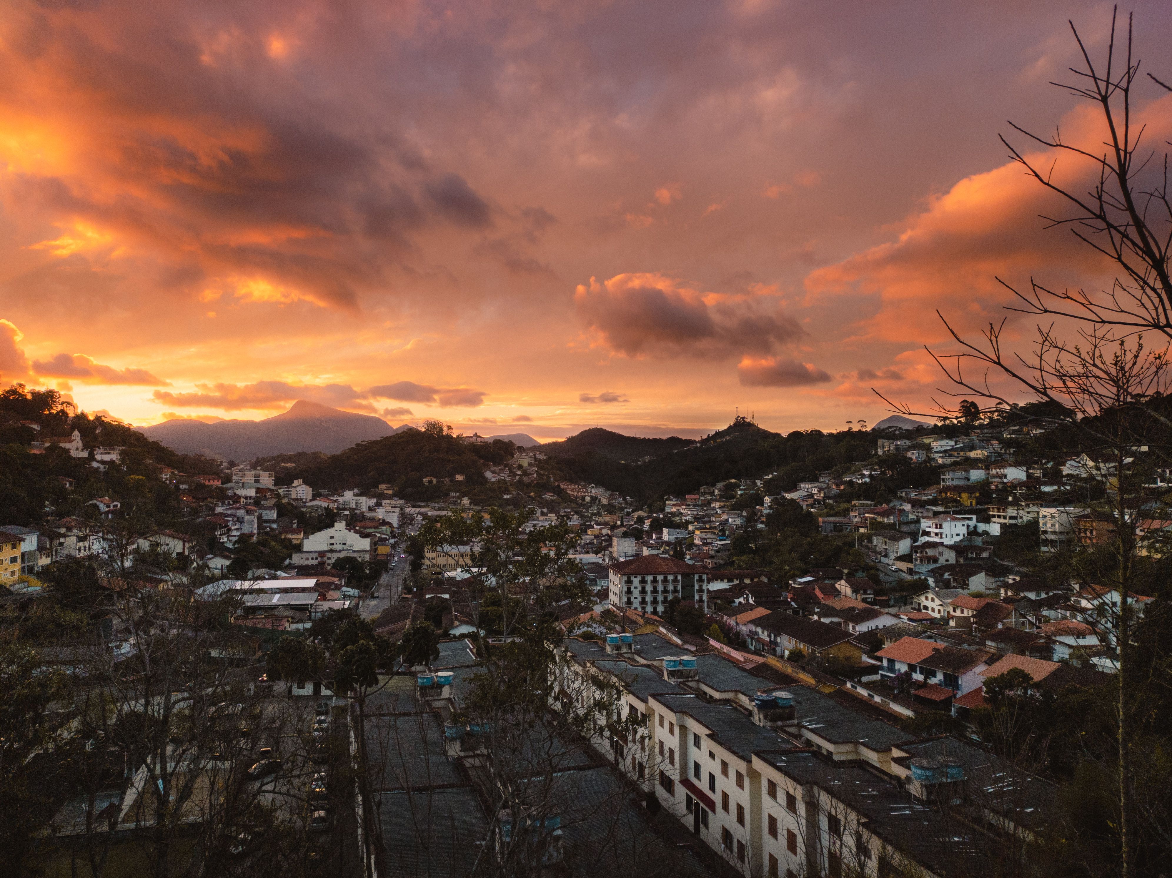 Town on a Mountain Area under Cloudy Sky · Free Stock Photo