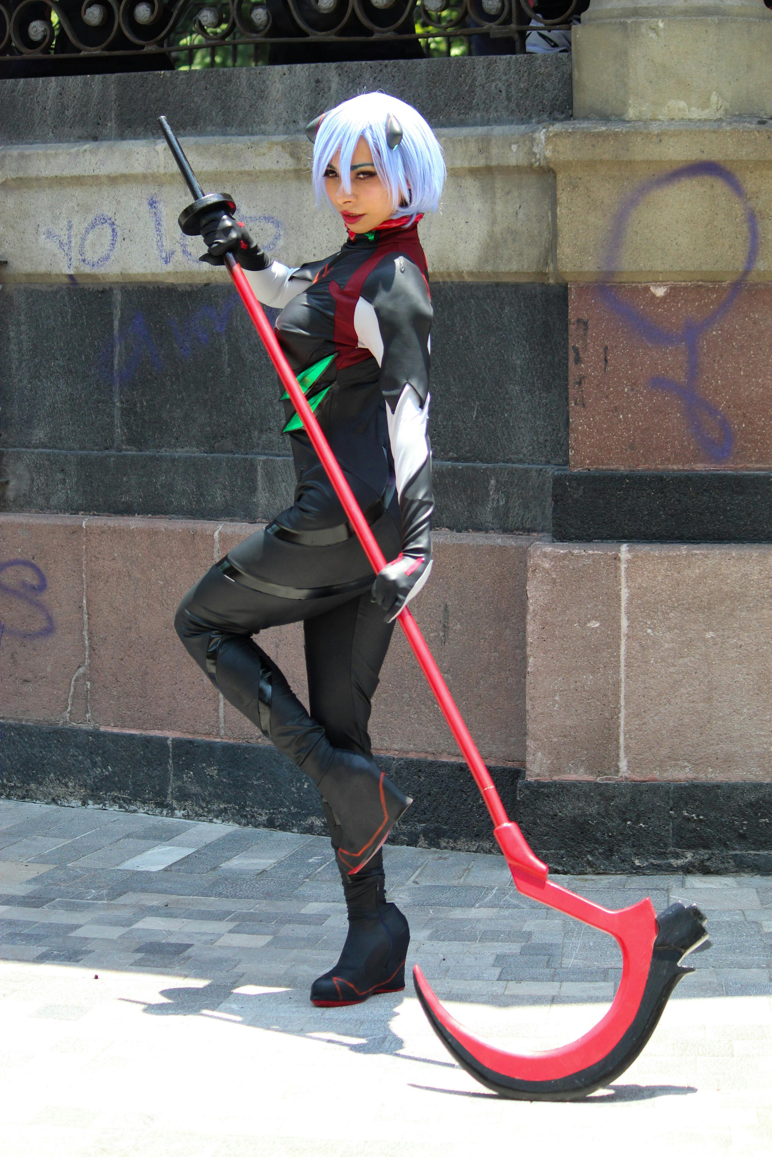 Cosplayer Holding a Scythe · Free Stock Photo