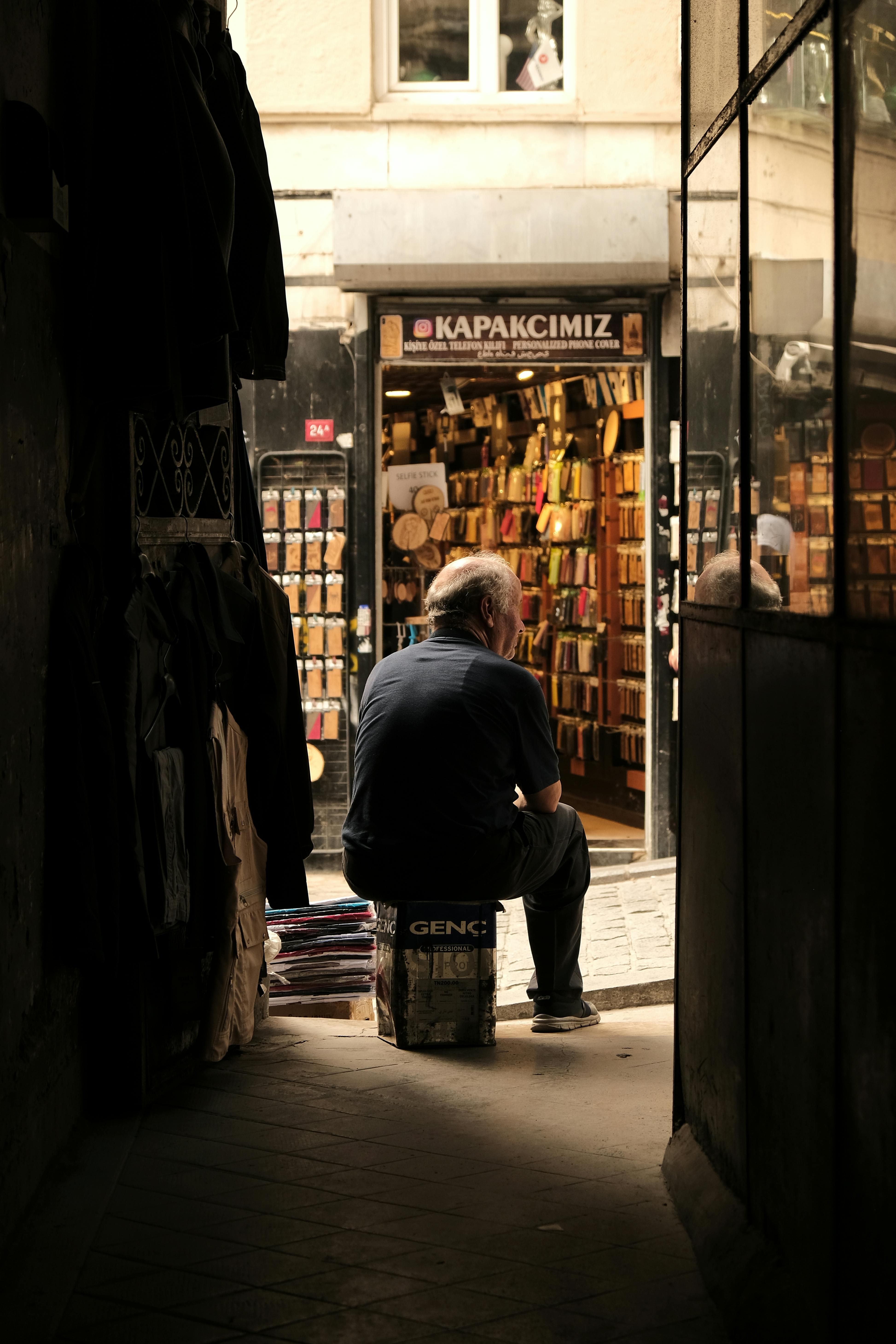 Elderly Man Standing in Entrance to Store · Free Stock Photo