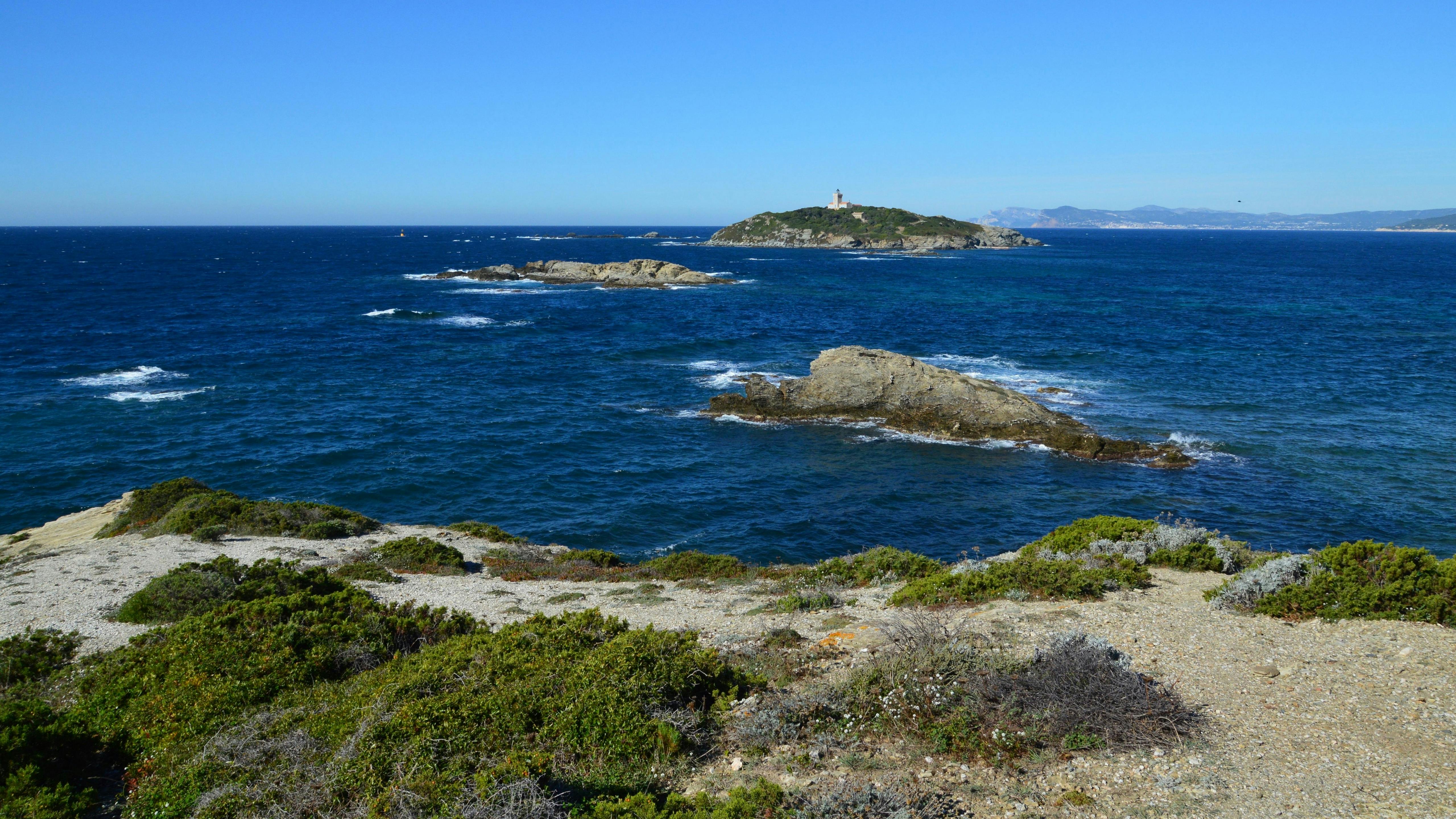 Rocks and Island on Sea · Free Stock Photo
