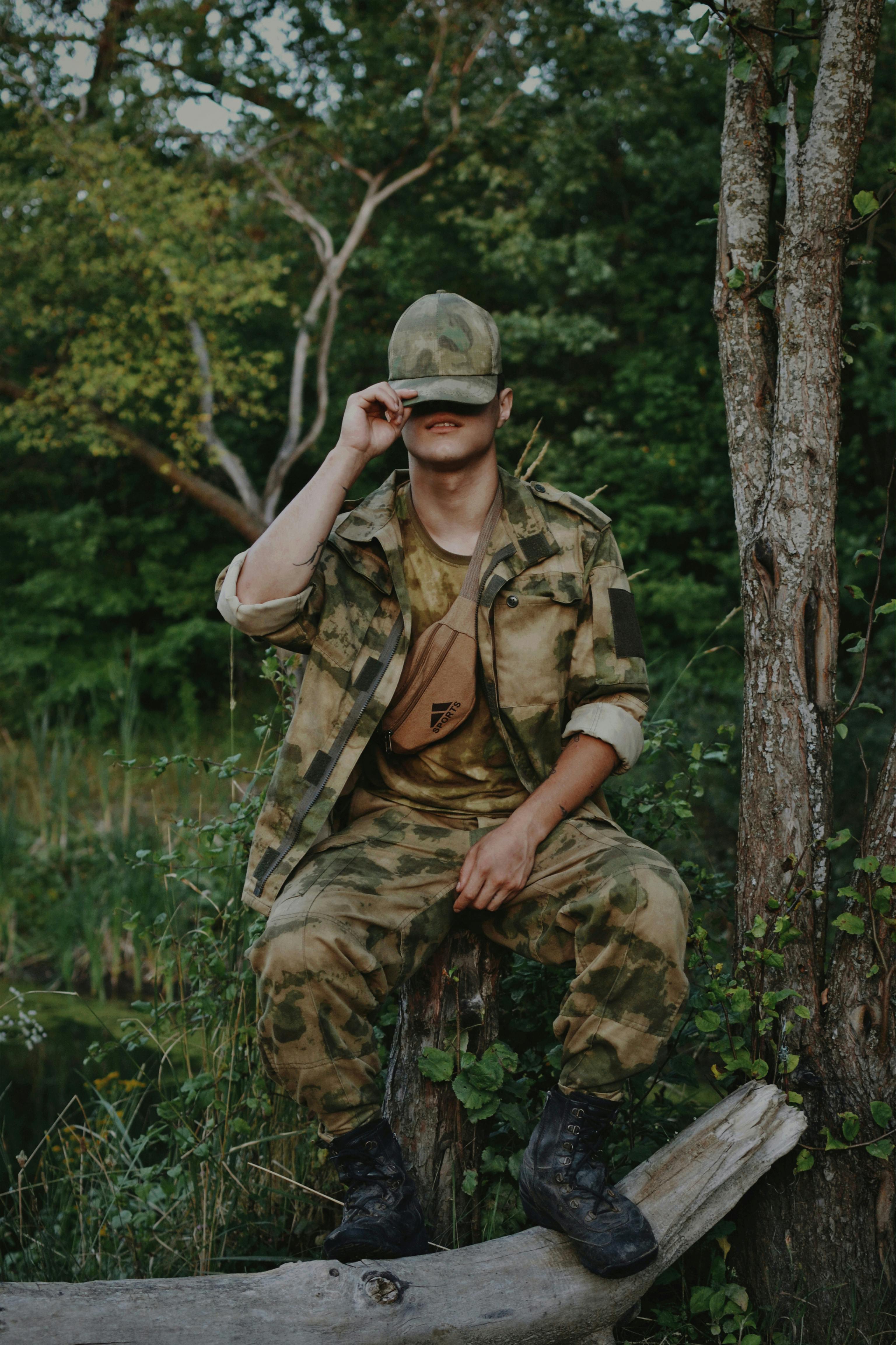 Man in a Costume Made of Earth and Moss · Free Stock Photo