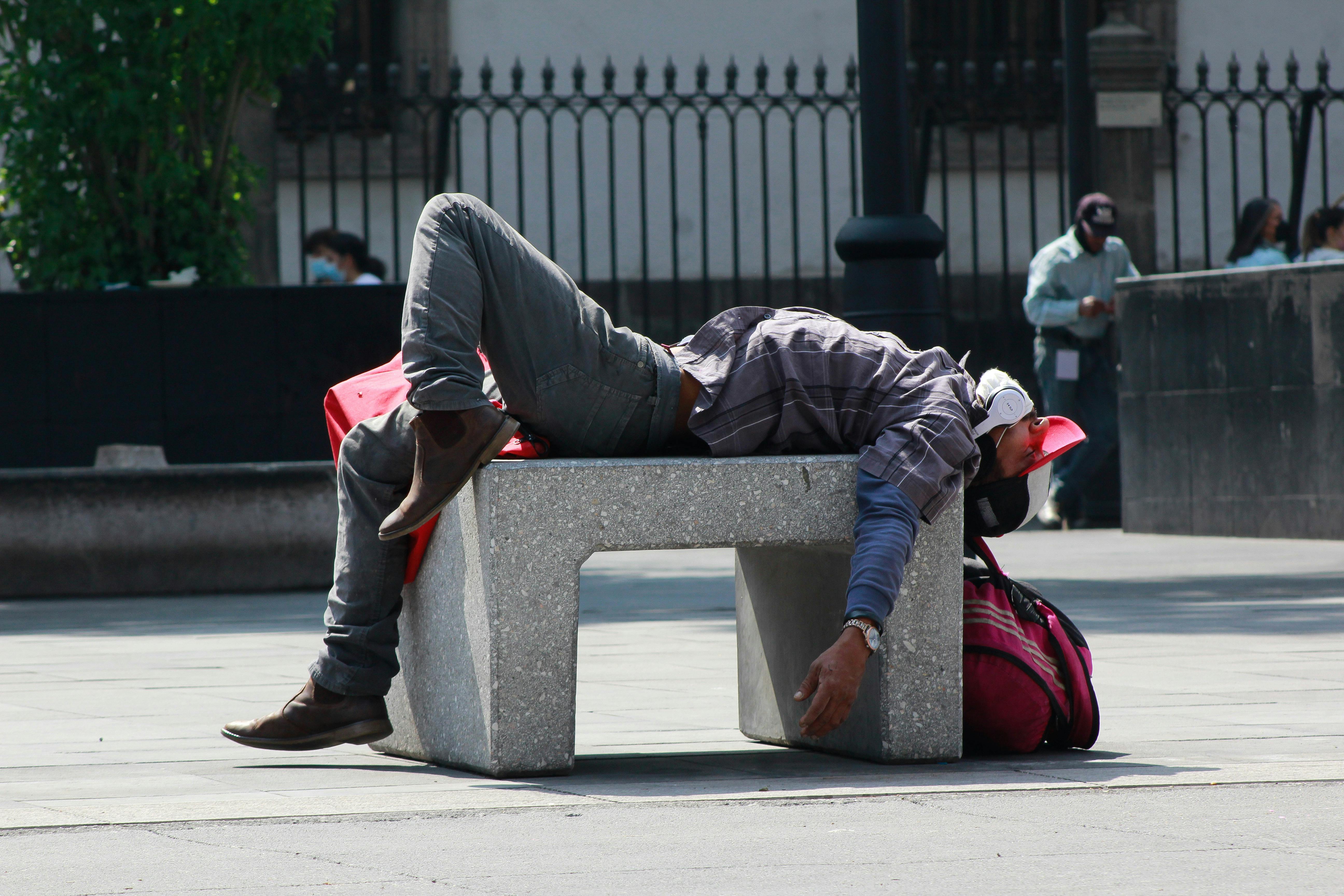 Man Sleeping on Bench · Free Stock Photo