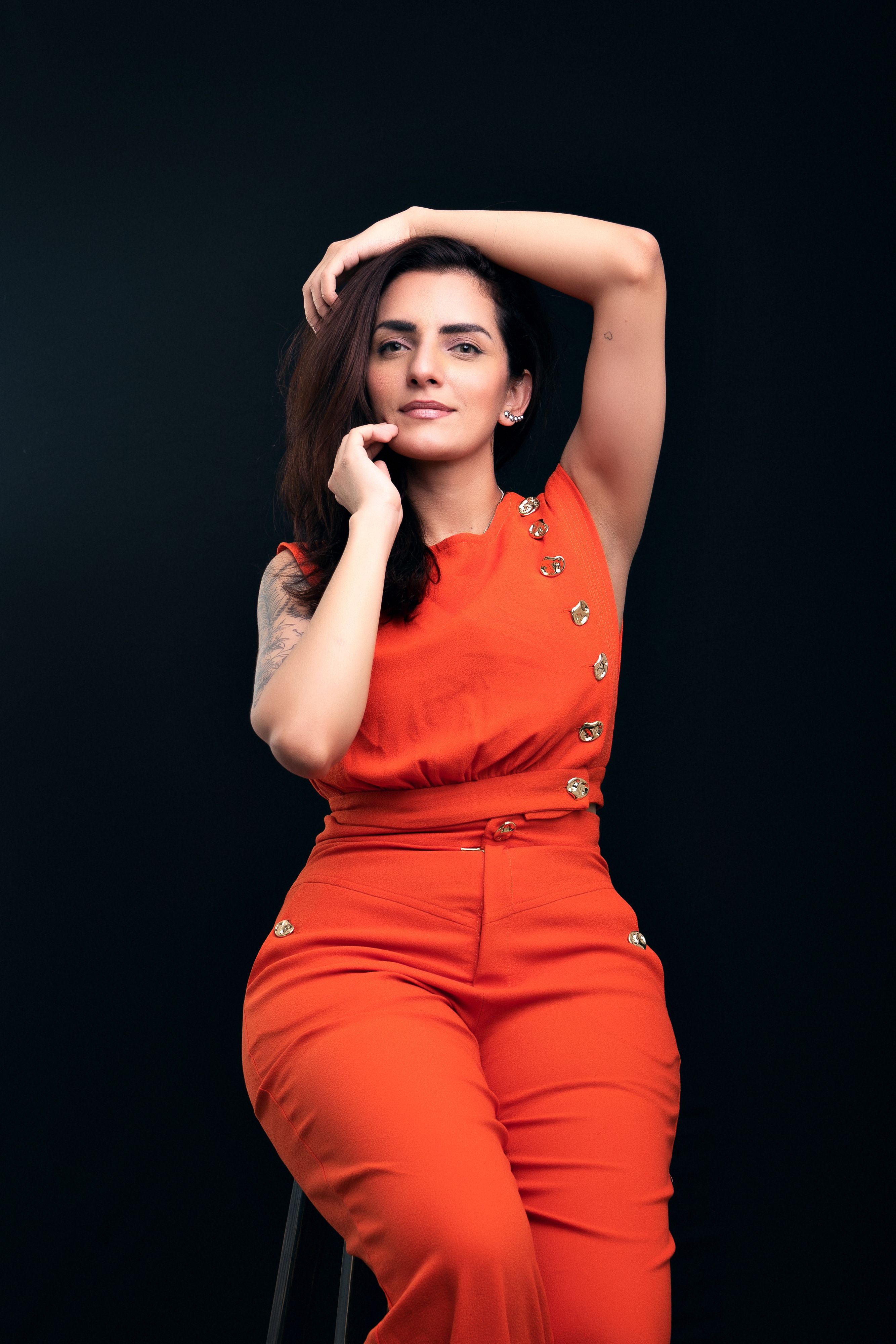 Woman Posing with Hand on Hair · Free Stock Photo