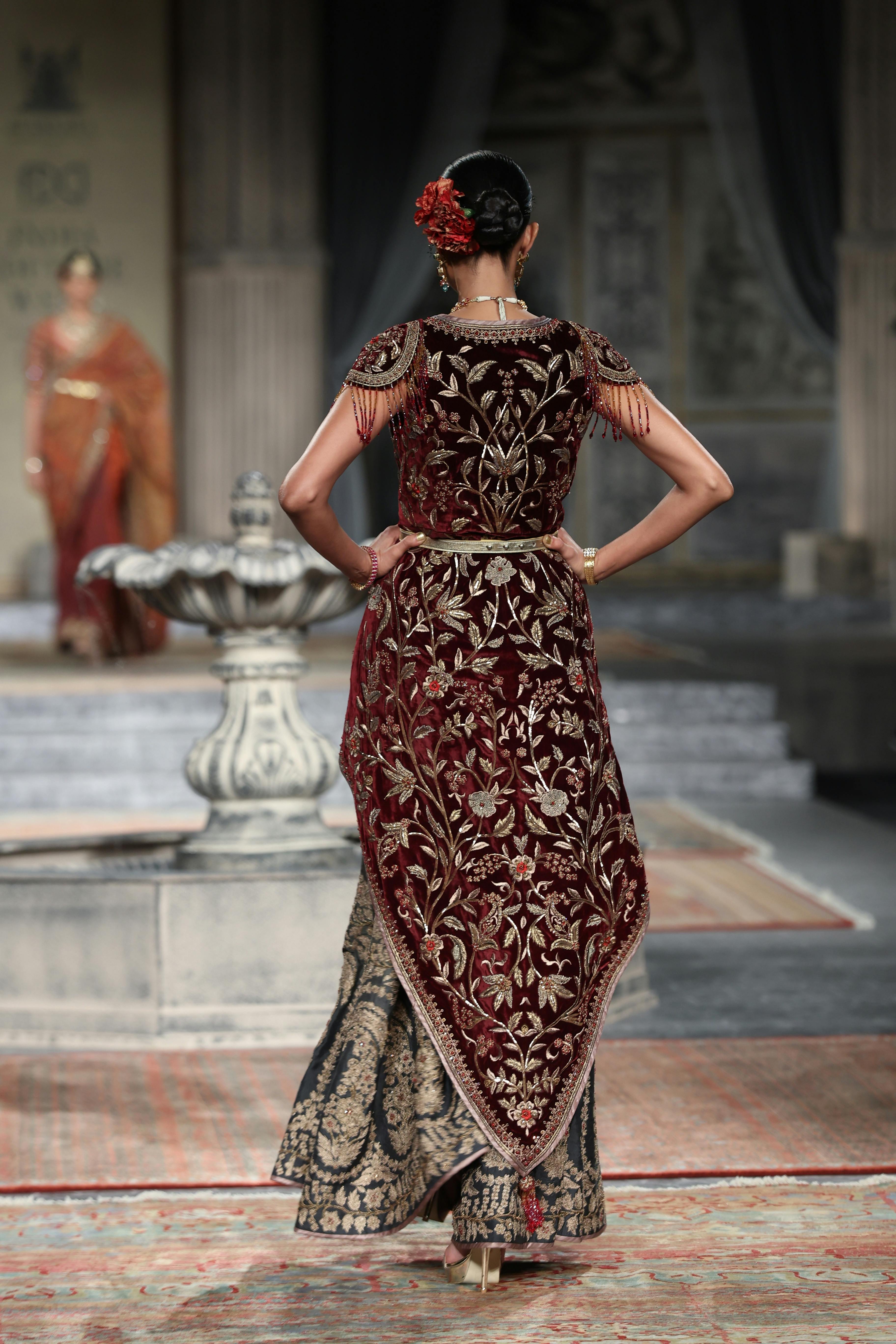 Back View of a Woman on a Catwalk · Free Stock Photo