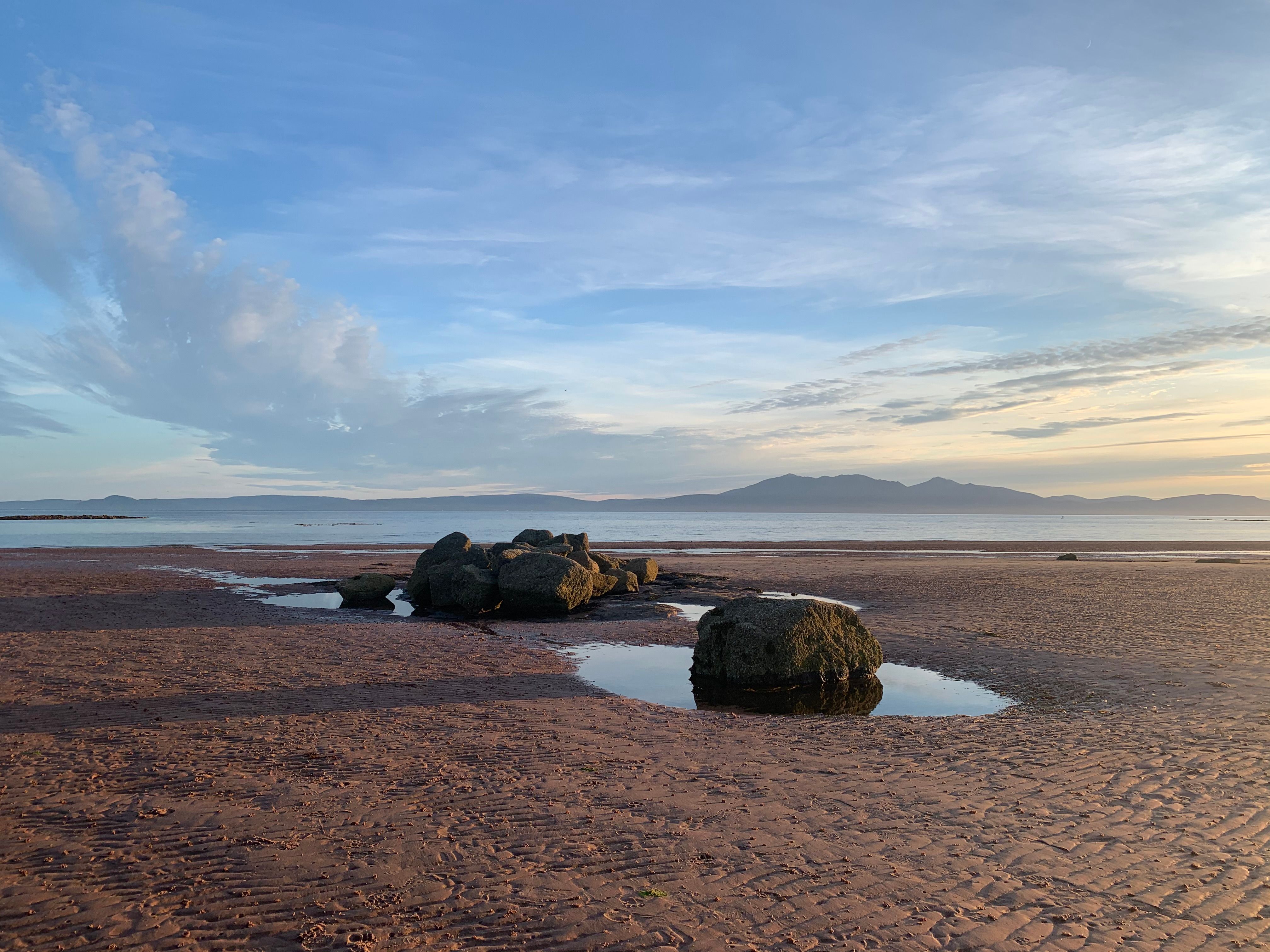Rocks in the Puddles on a Beach · Free Stock Photo