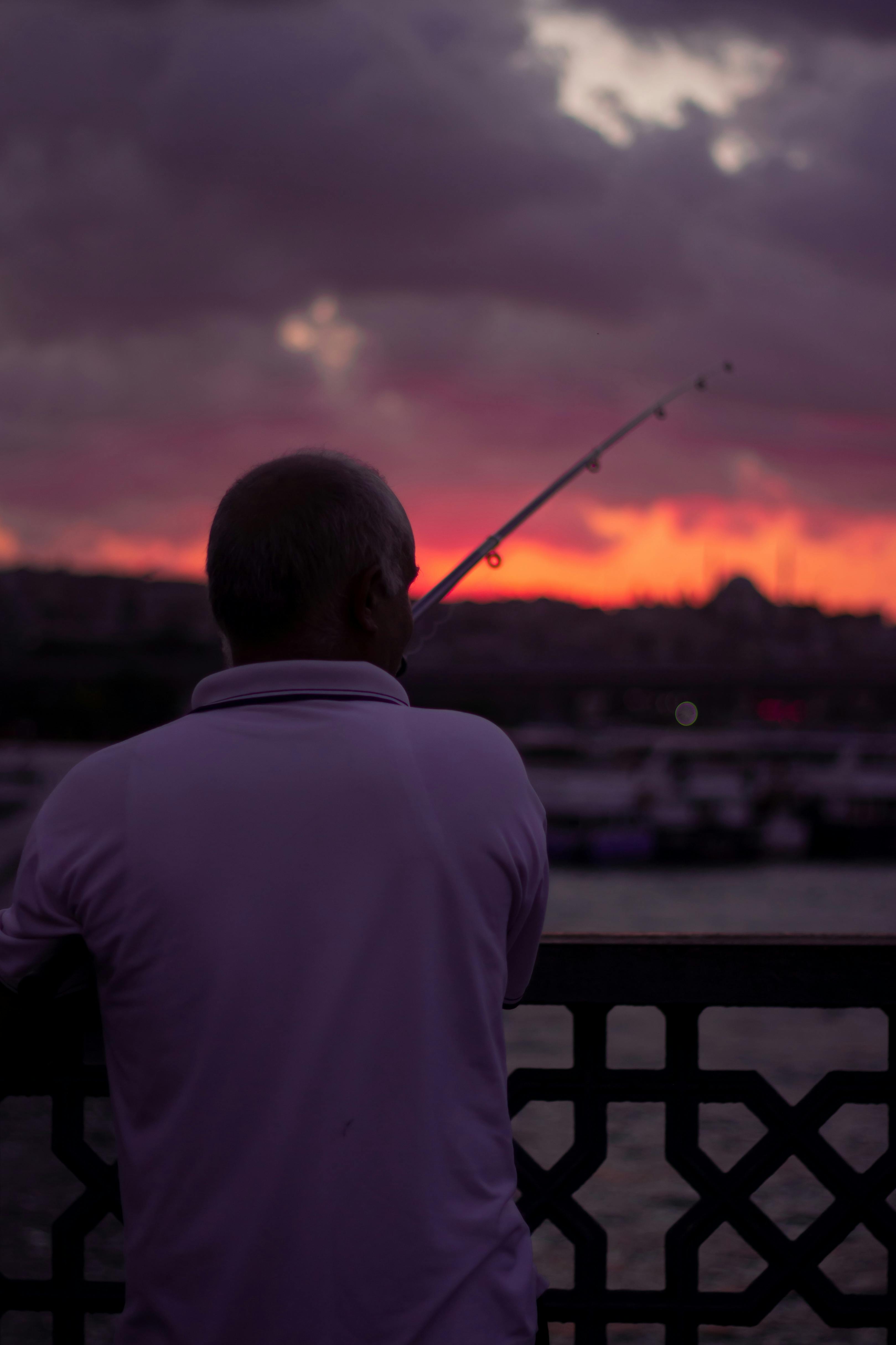 Man Using Fishing Rod · Free Stock Photo