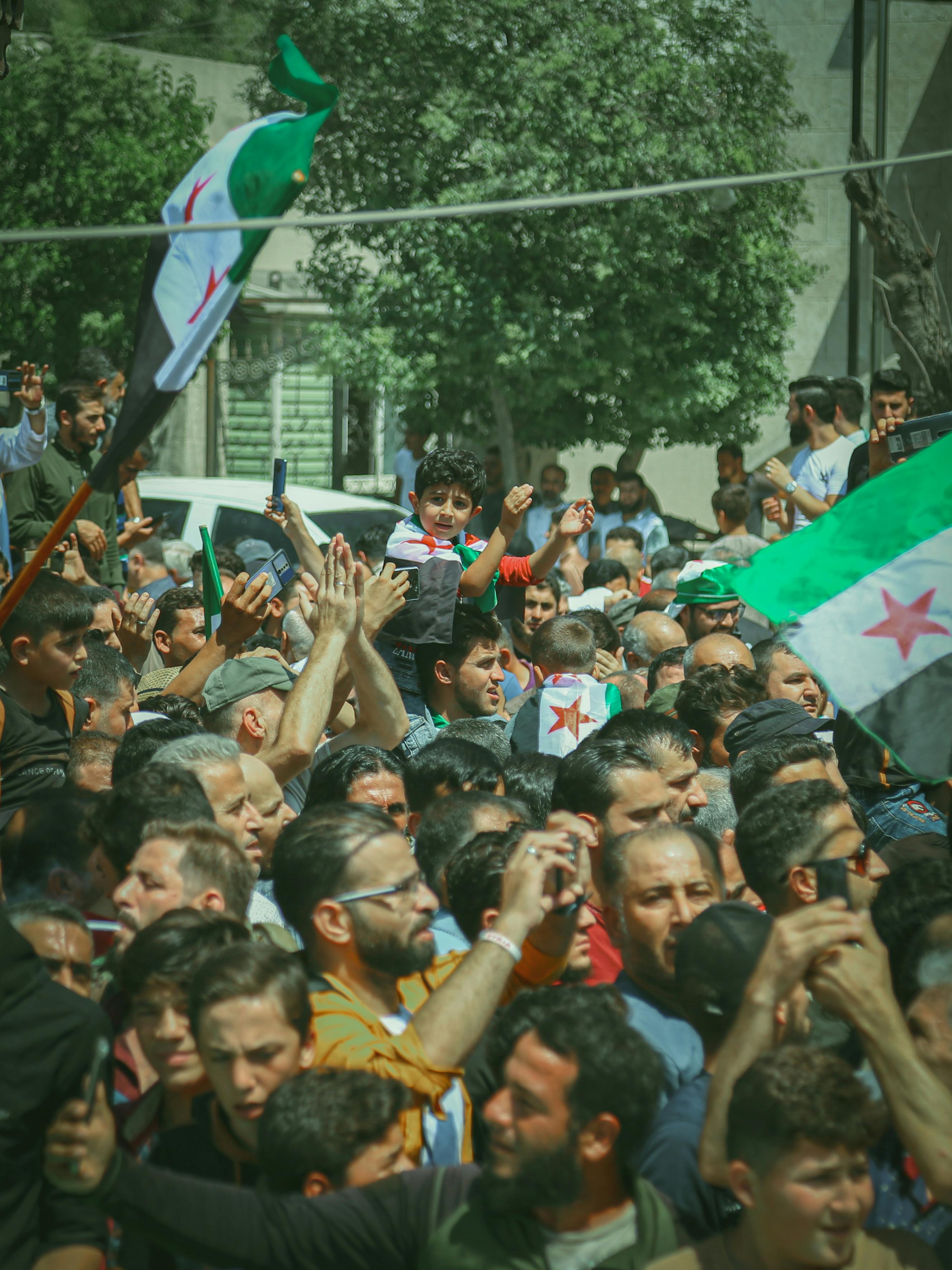 A Crowd with Banners during a Protest · Free Stock Photo