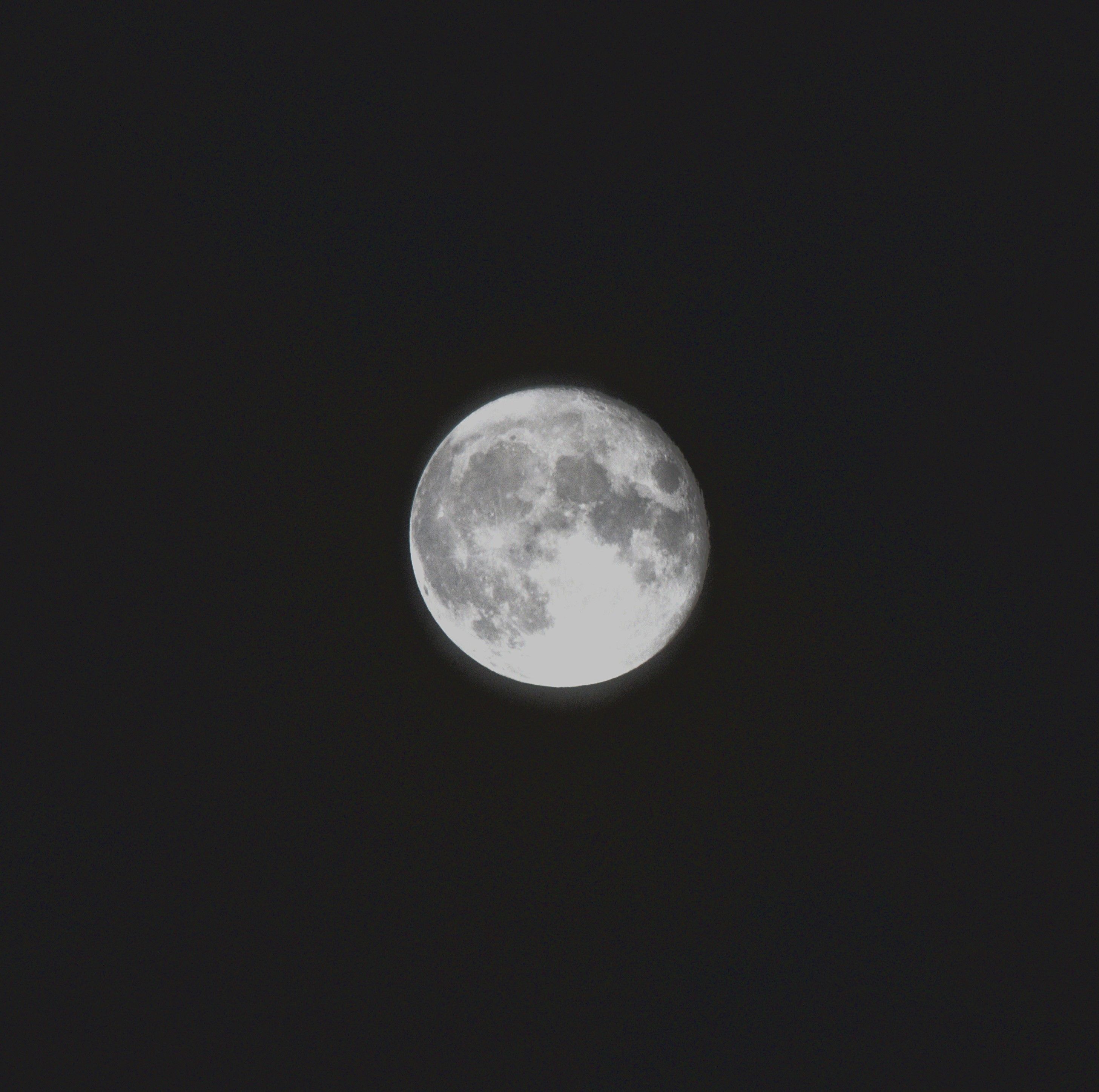 Grayscale Photo of a Full Moon · Free Stock Photo