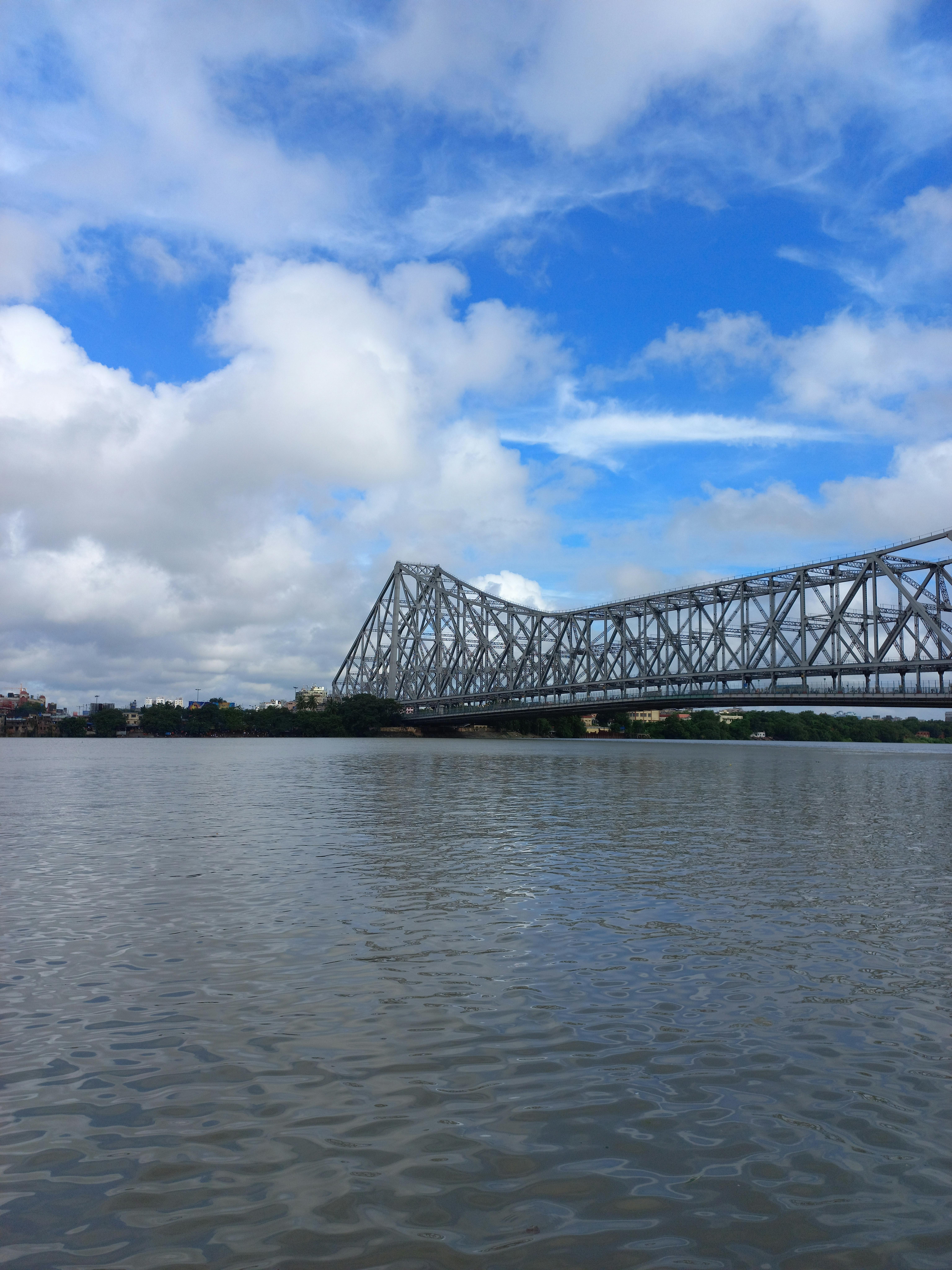 A Bridge Under the Blue Sky and White Clouds · Free Stock Photo